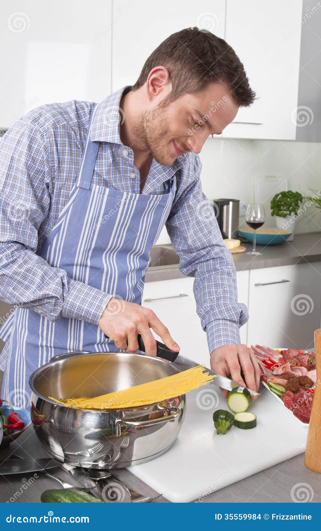 Happy Man Cooking Pasta in the Kitchen Stock Photo - Image of casual ...