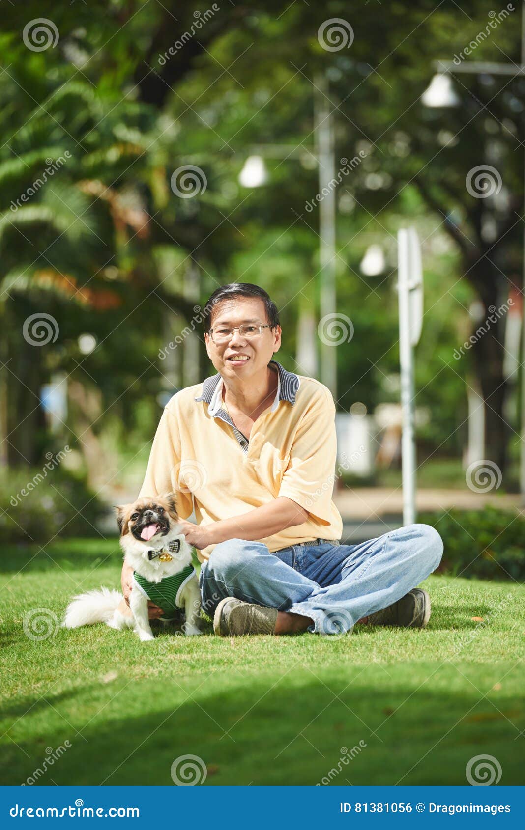 Happy man with dog stock photo. Image of sitting, portrait - 81381056