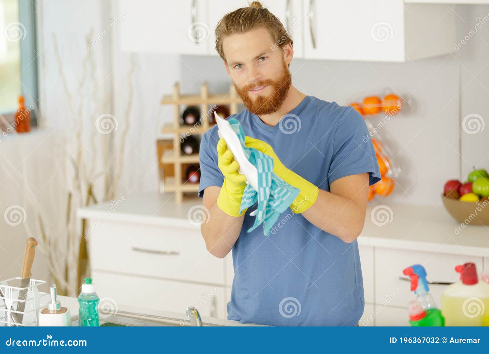 Happy man doing washing up stock photo. Image of adult - 196367032