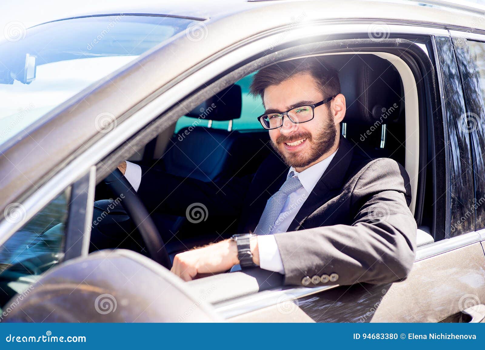 Happy man driving a car stock photo. Image of owner, confident - 94683380