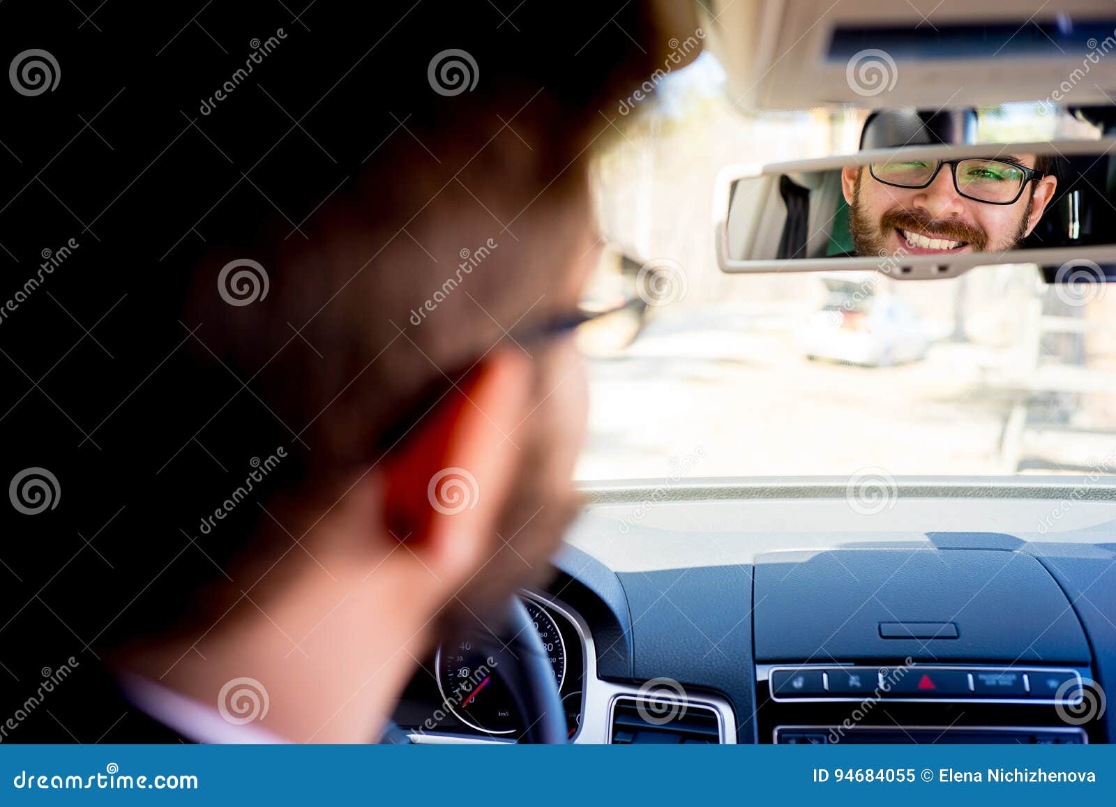 Happy man driving a car stock image. Image of customer - 94684055
