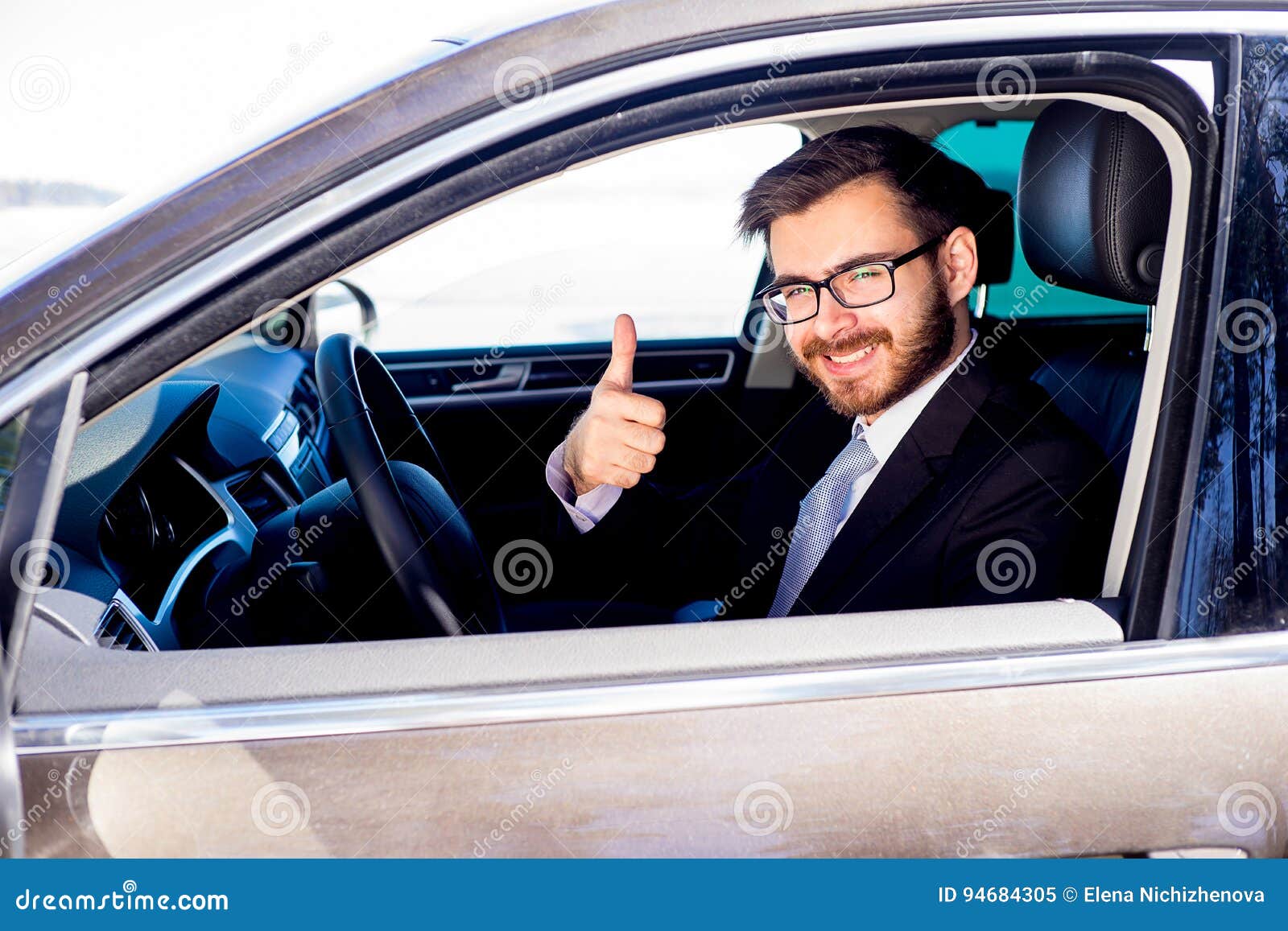 Happy man driving a car stock image. Image of selling - 94684305