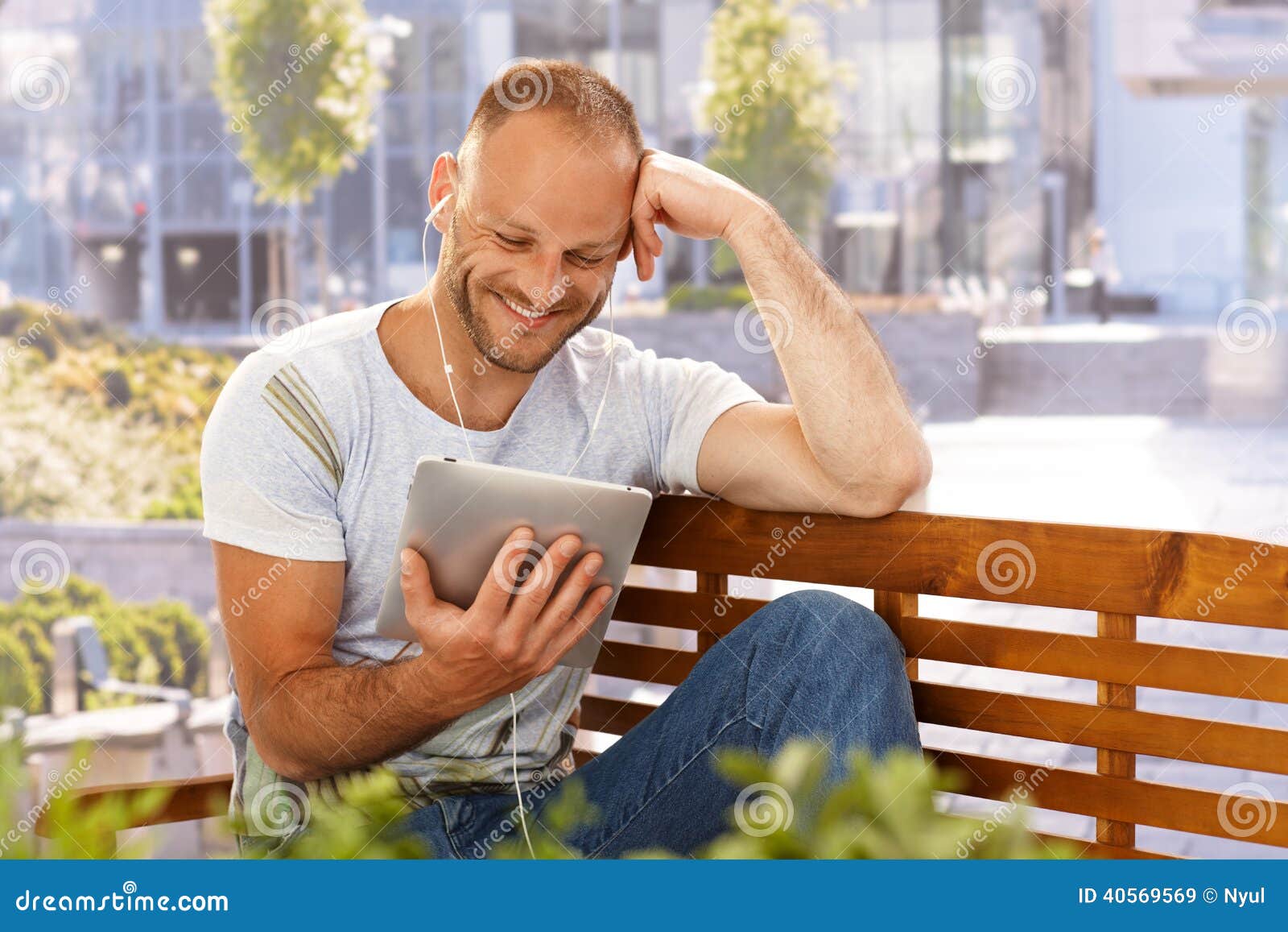 Happy Man with E-book Reader Stock Image - Image of face, happy: 40569569