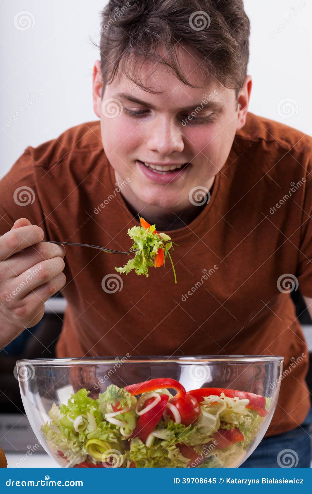 Happy man eating salad stock image. Image of healthy - 39708645