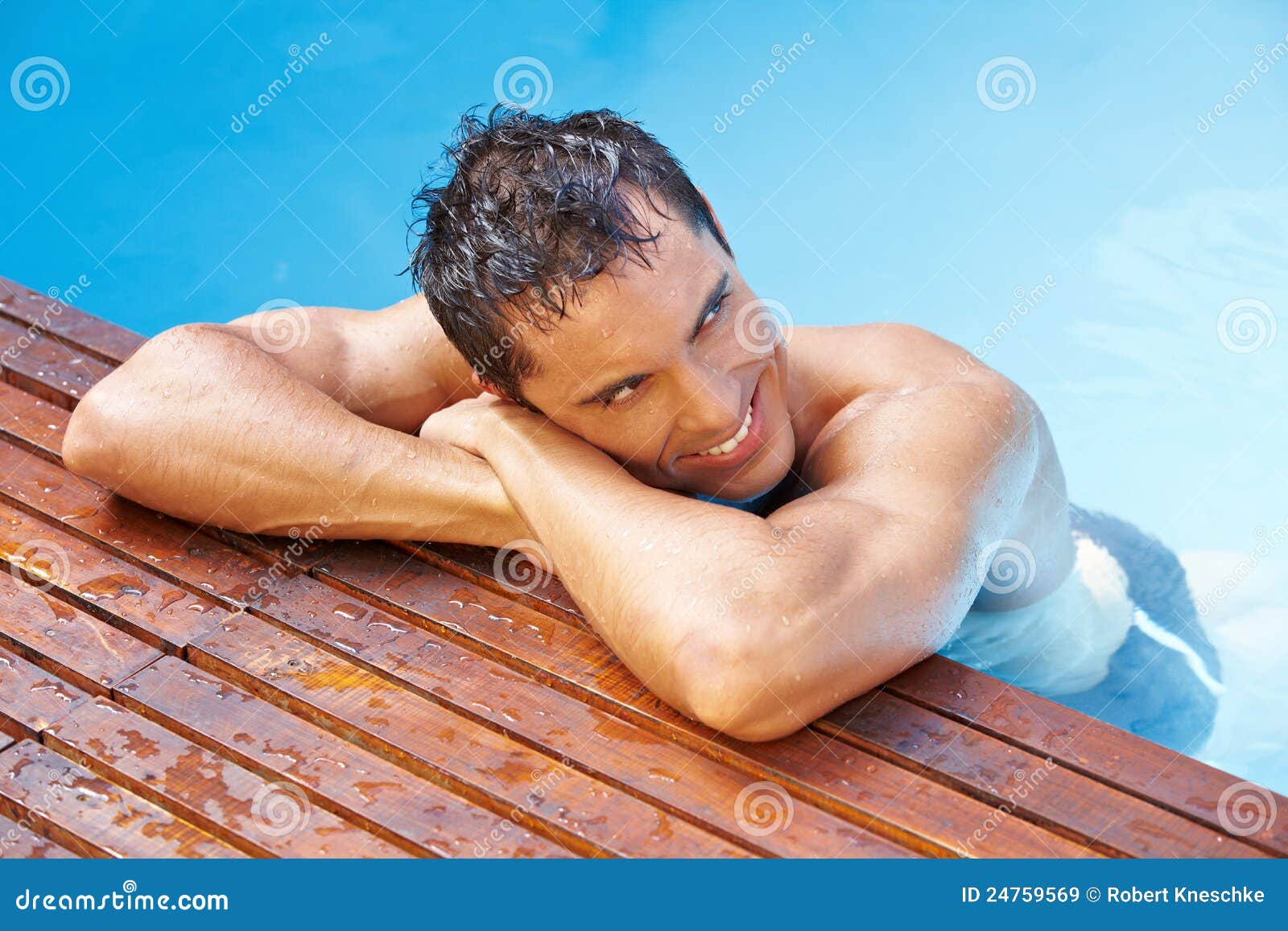 Happy man at edge of pool stock image. Image of portrait - 24759569