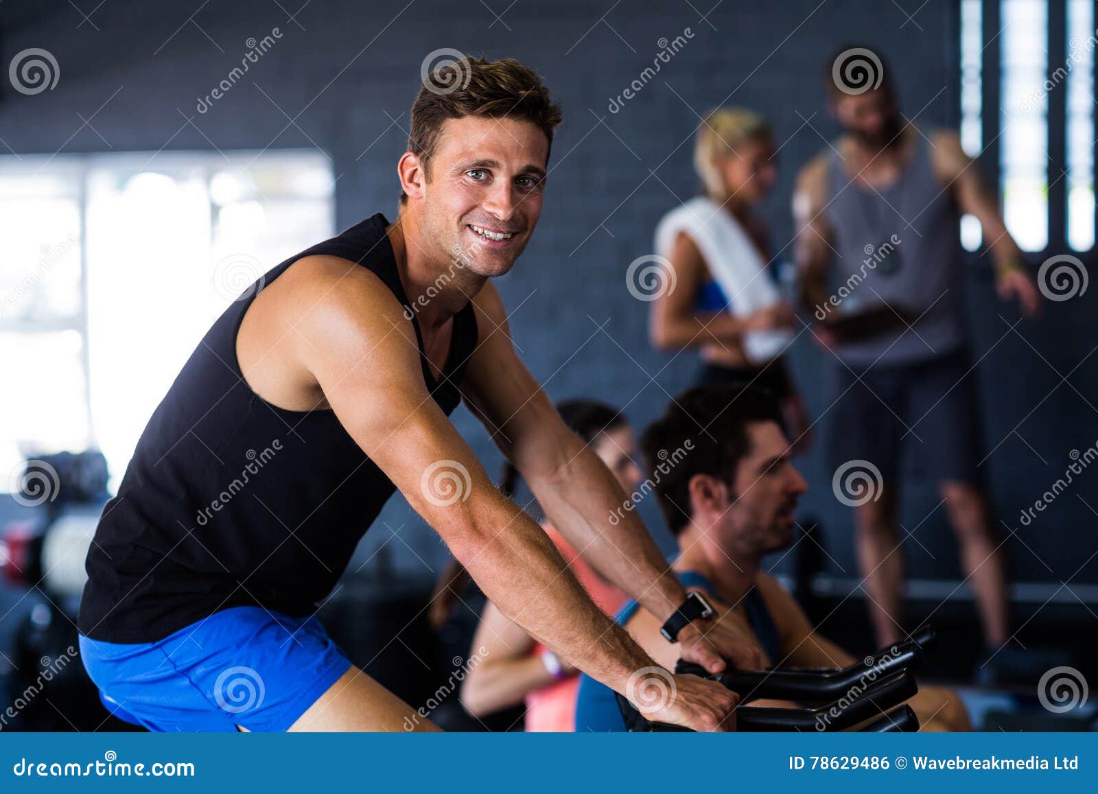 Happy Man Exercising in Gym Stock Photo - Image of foreground, sport ...