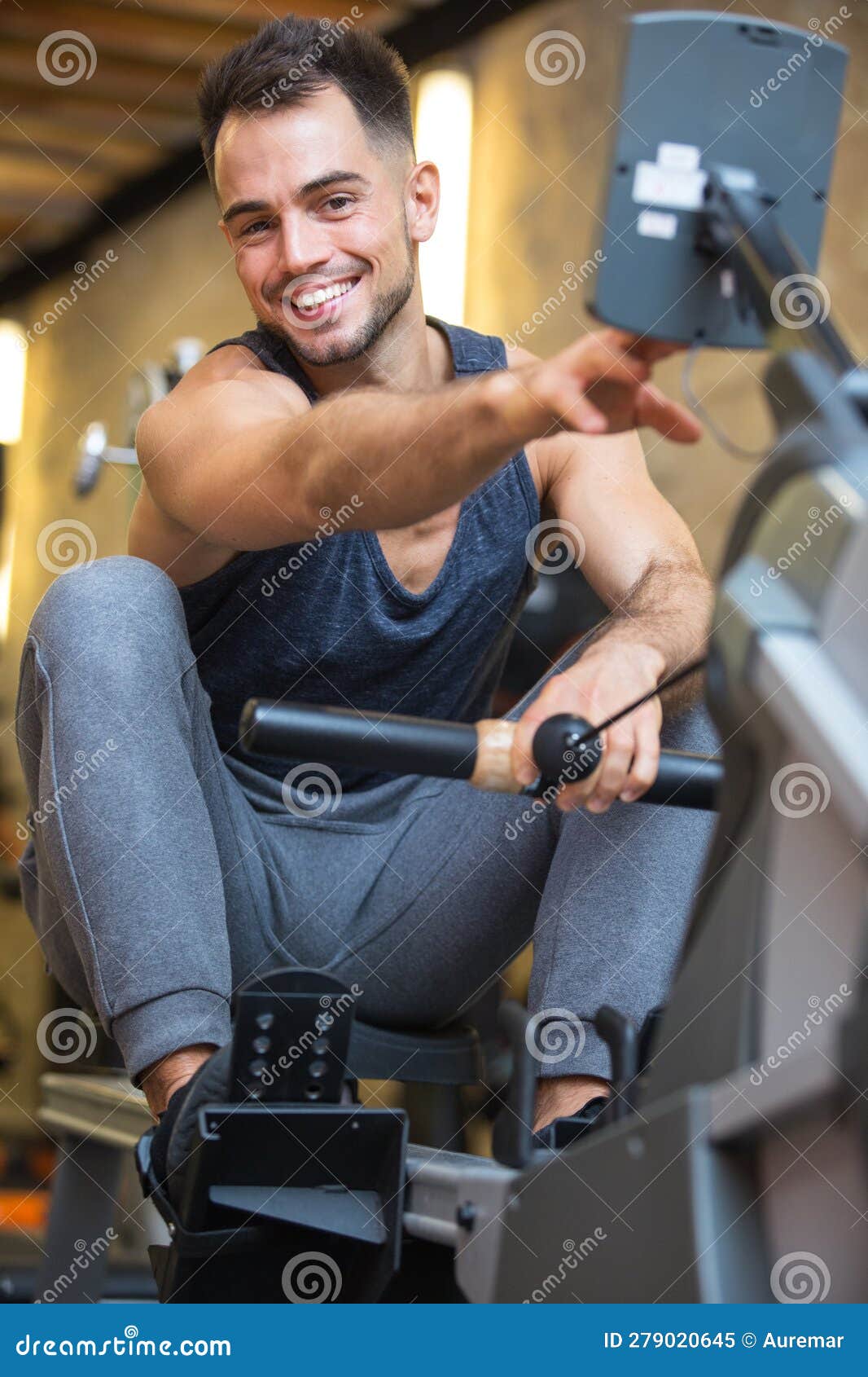 Happy Man Exercising on Rowing Machine Stock Image - Image of muscles ...