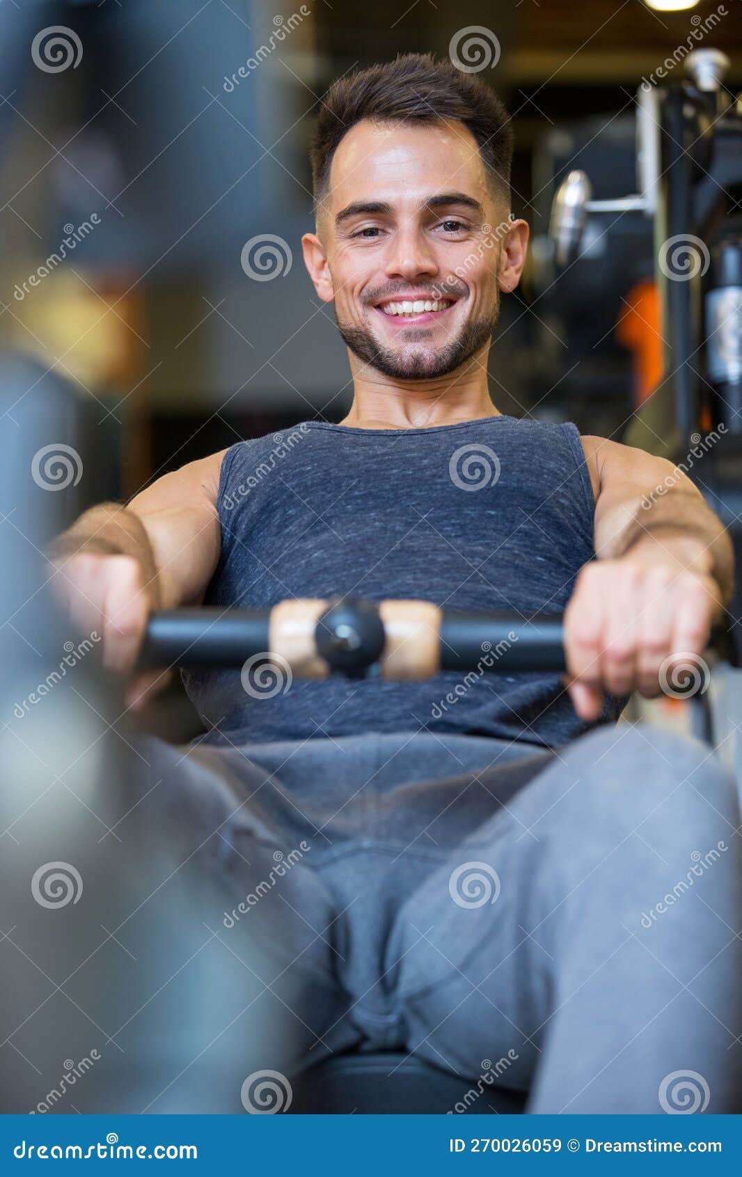 Happy Man Exercising on Rowing Machine Stock Image - Image of single ...