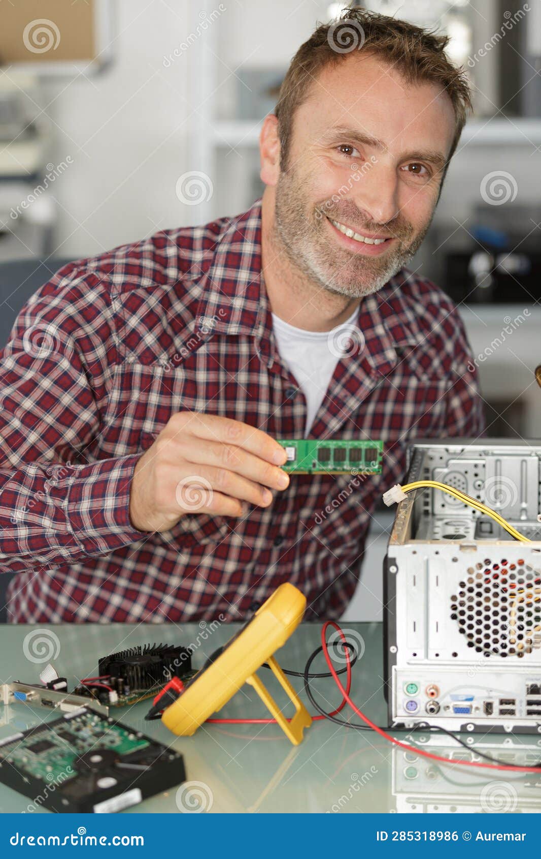 Happy Man Fixing Electronics Stock Photo - Image of technician ...
