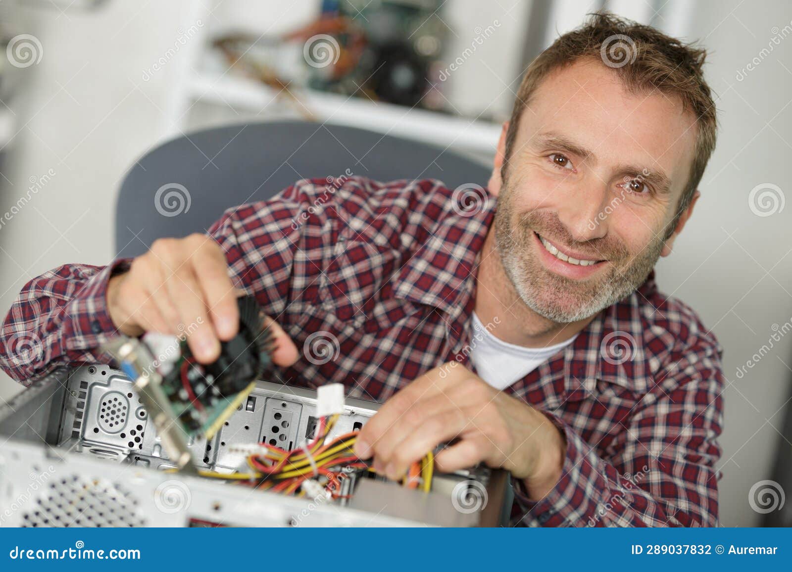 Happy man fixing pc stock photo. Image of chip, electronic - 289037832