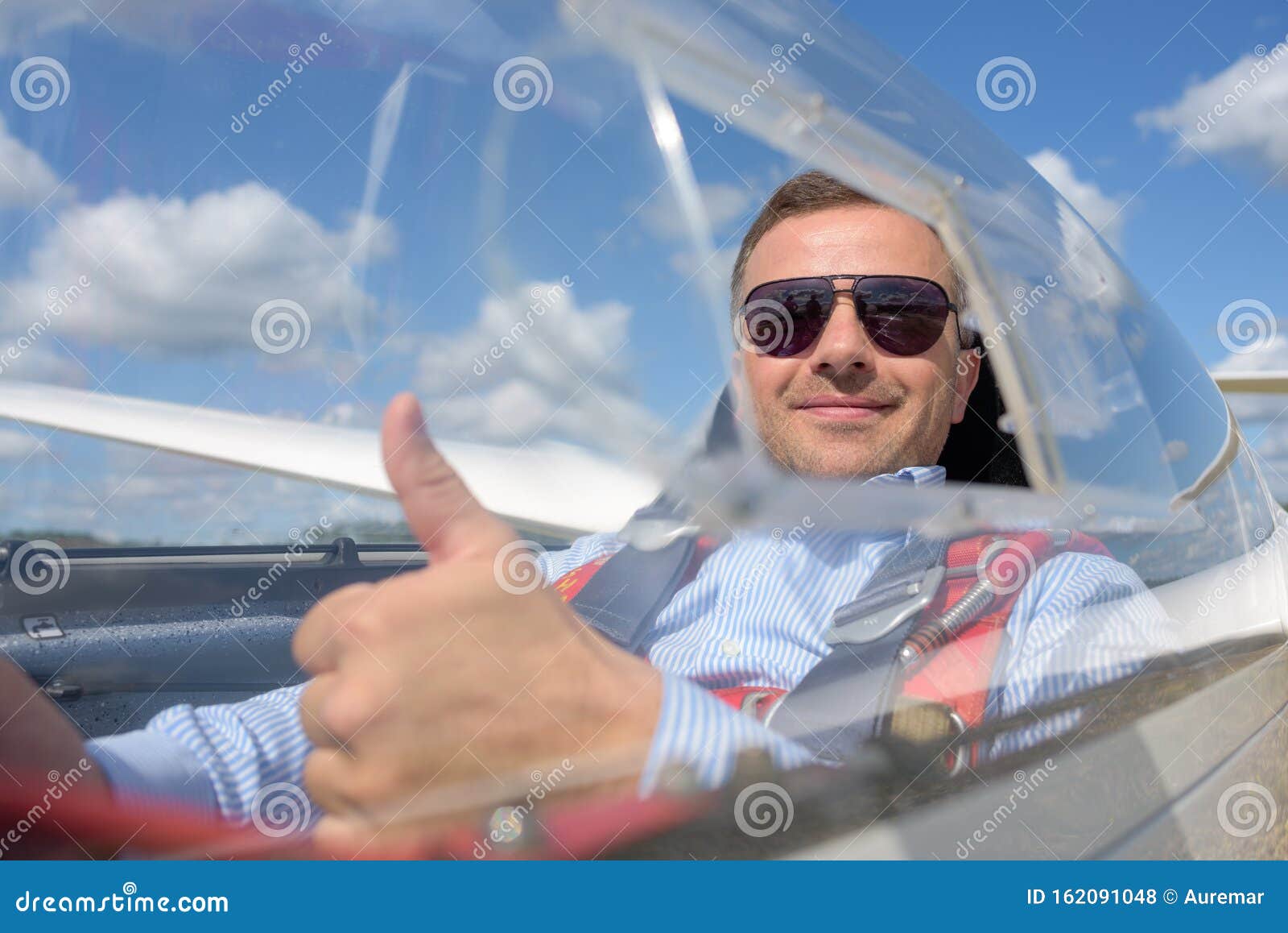 Happy man in glider stock photo. Image of control, captain - 162091048