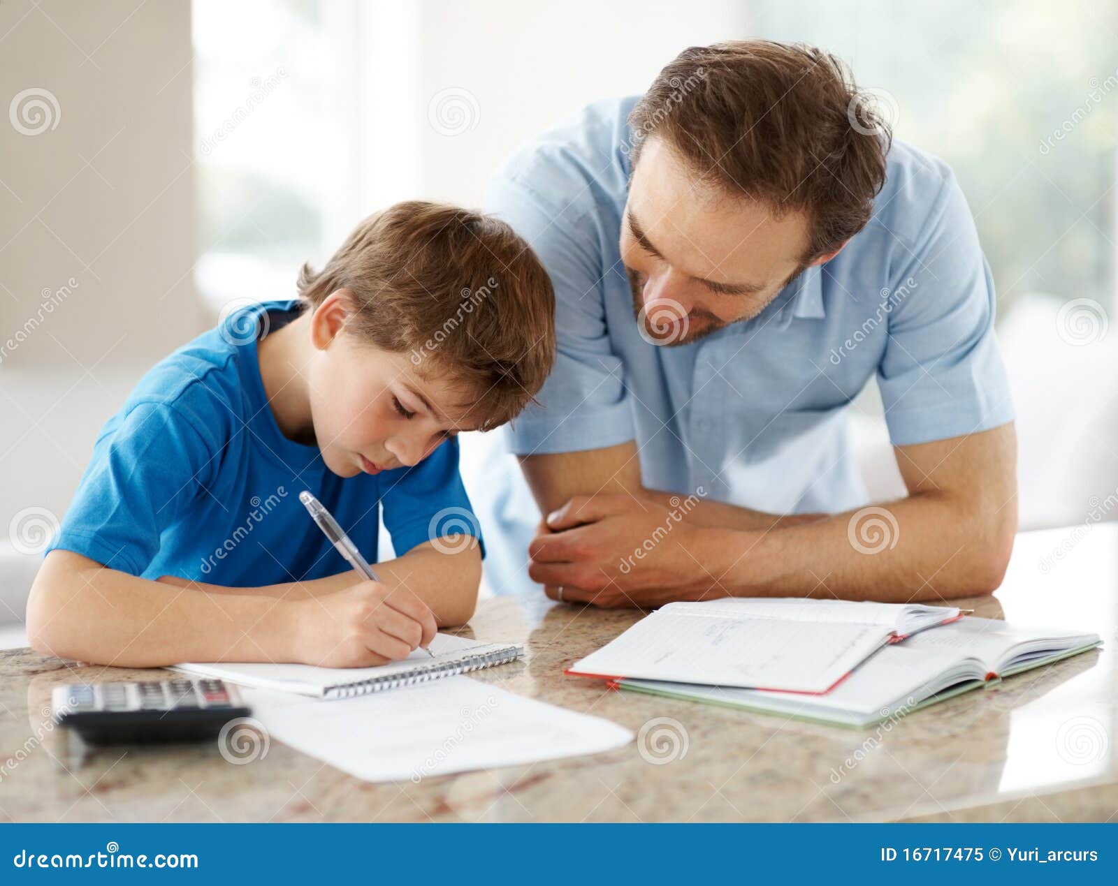 Happy Man Helping His Son To Do Homework Stock Image - Image of reading ...