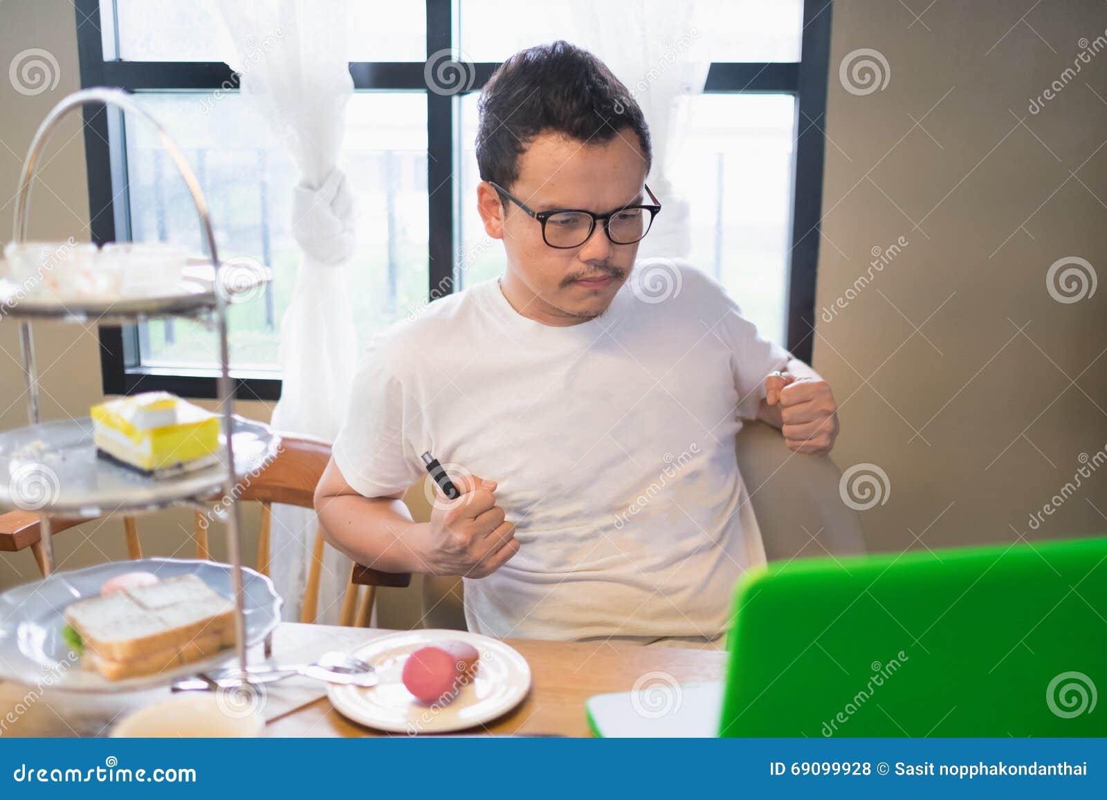 A Happy Man and His Computer at Tea Time Stock Photo - Image of ...