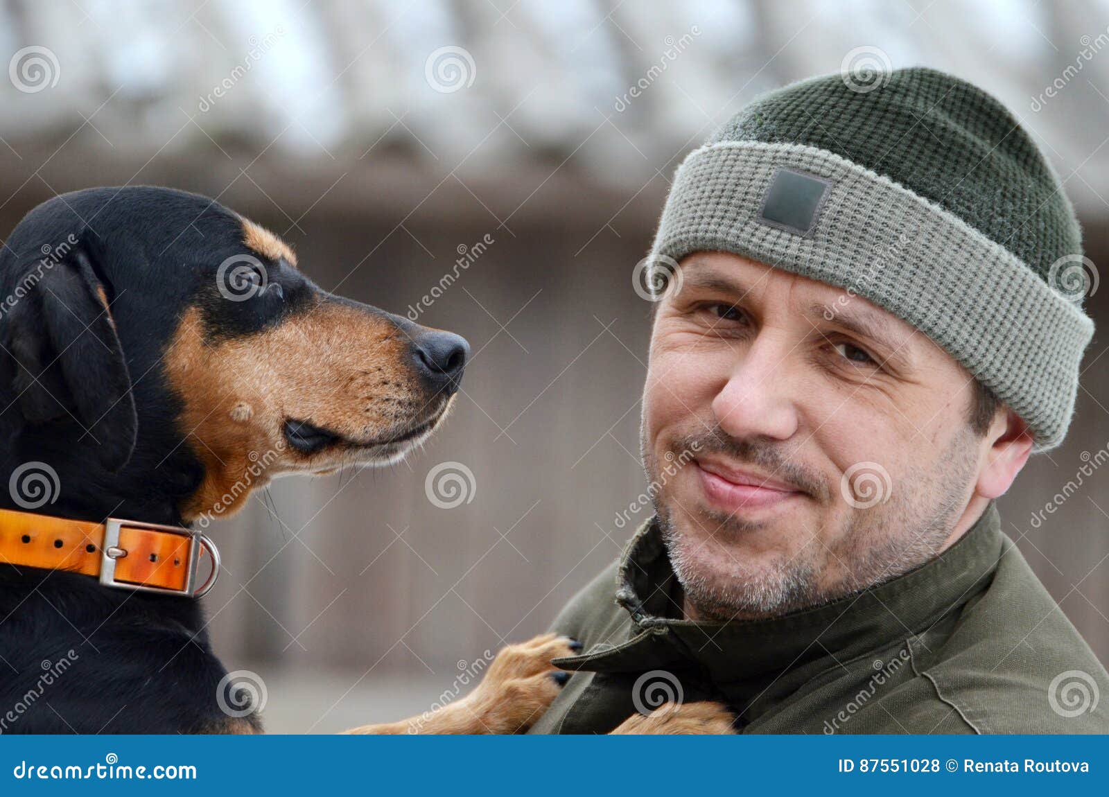 Happy man with his dog stock photo. Image of khaki, green - 87551028
