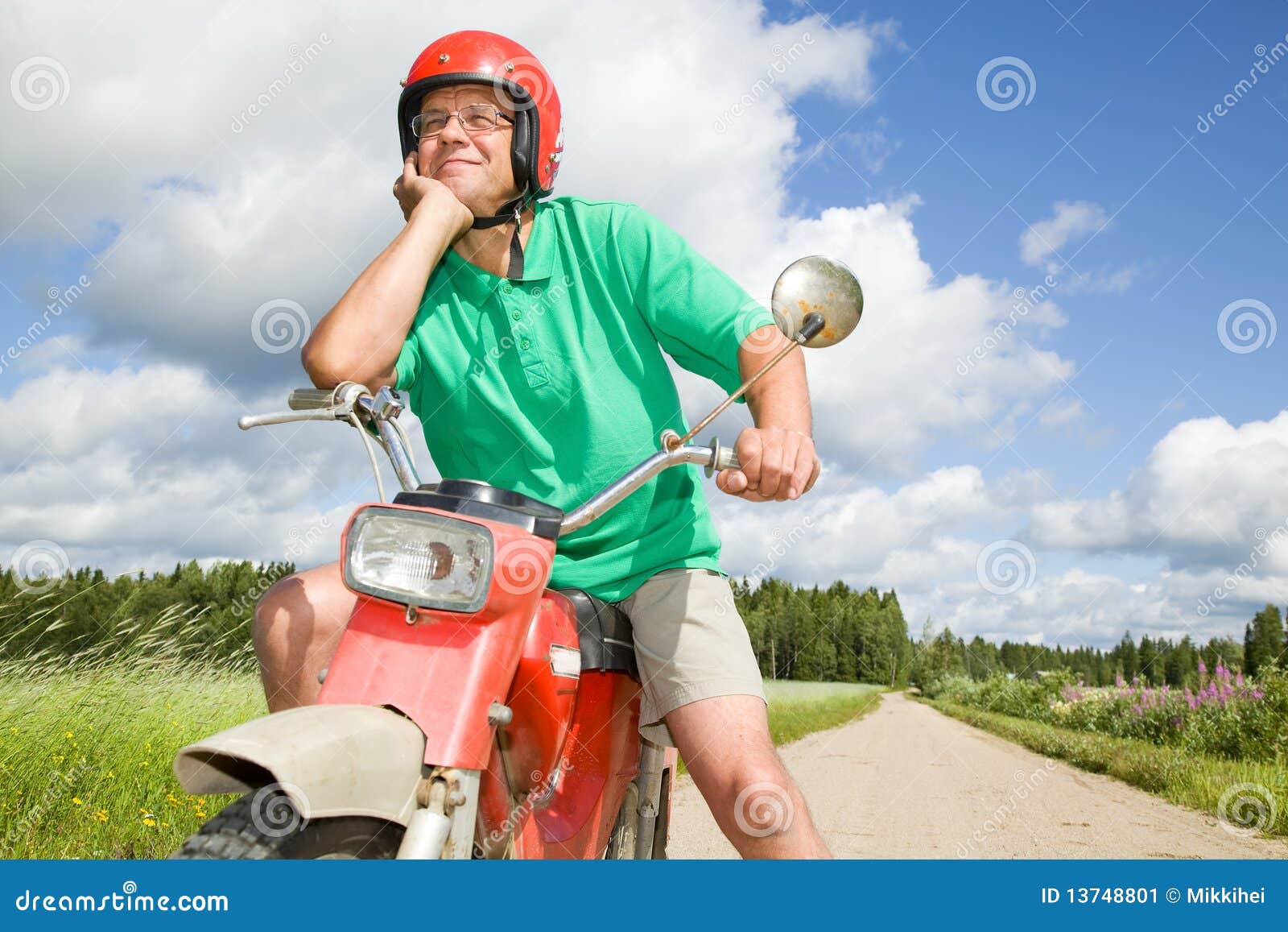 Happy man with his moped stock image. Image of motion - 13748801