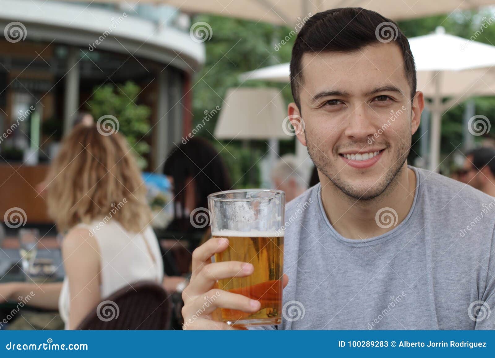 Happy Man Holding His Cold Refreshing Beer Stock Image - Image of mixed ...