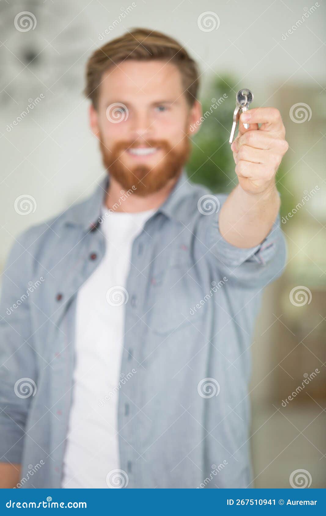Happy man holding keys stock image. Image of hold, future - 267510941