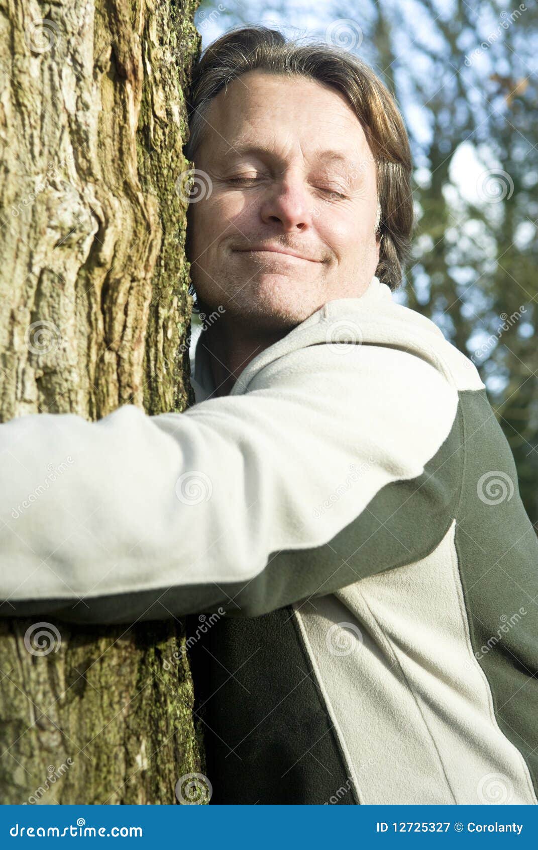 Man Hugging Tree