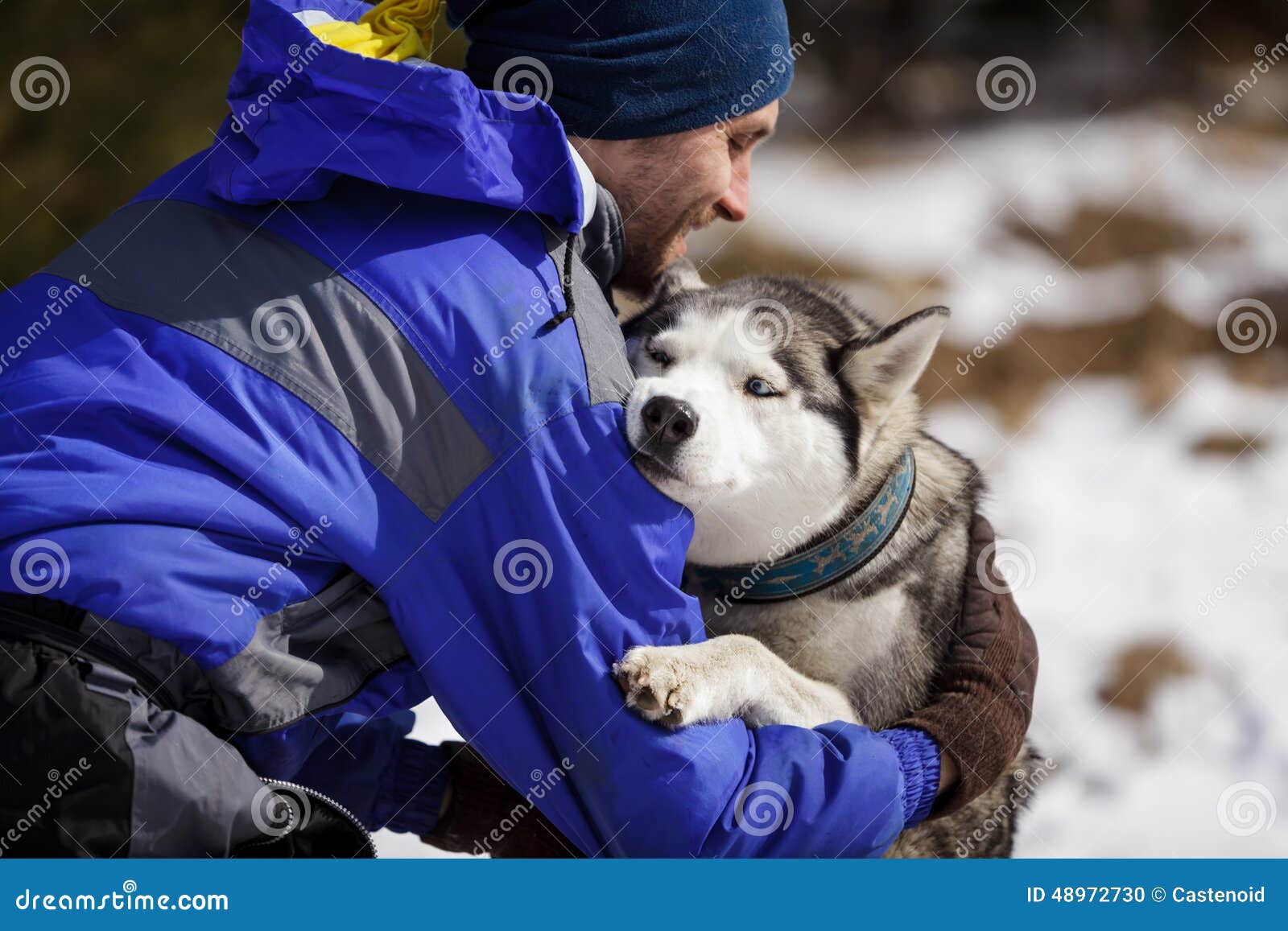 Happy man with a husky stock photo. Image of husky, hand - 48972730