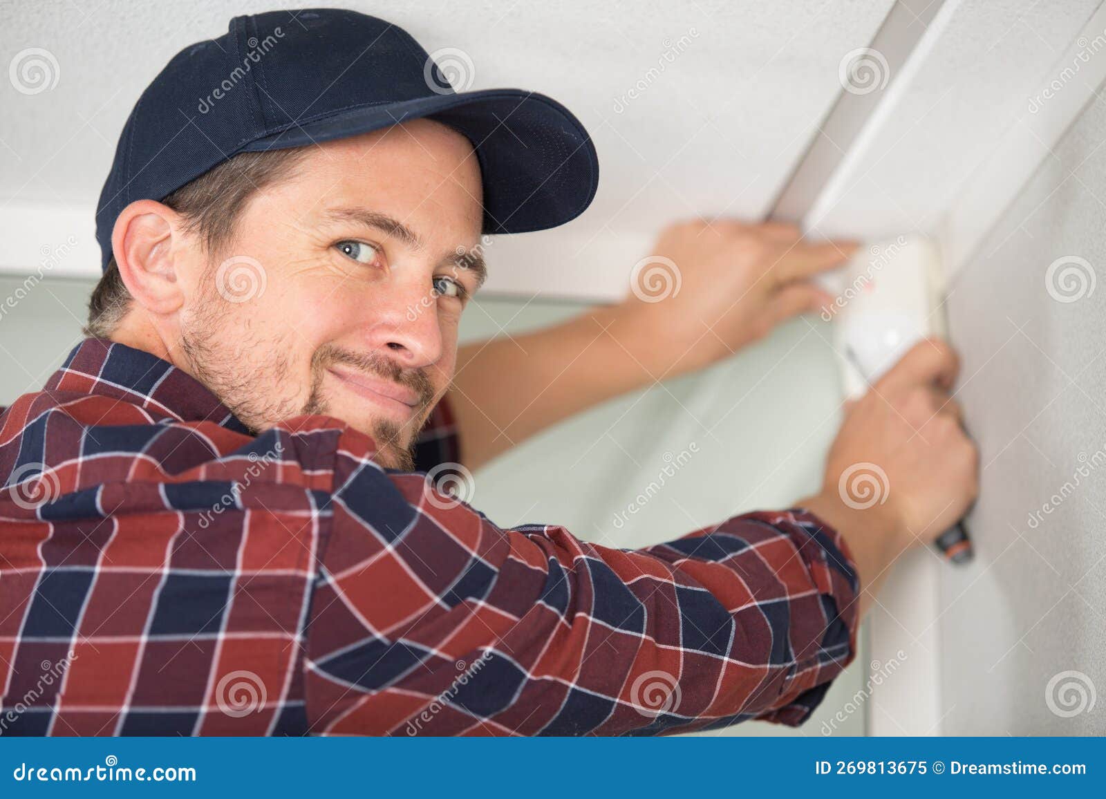 Happy Man Installing Security System Stock Image - Image of electric ...