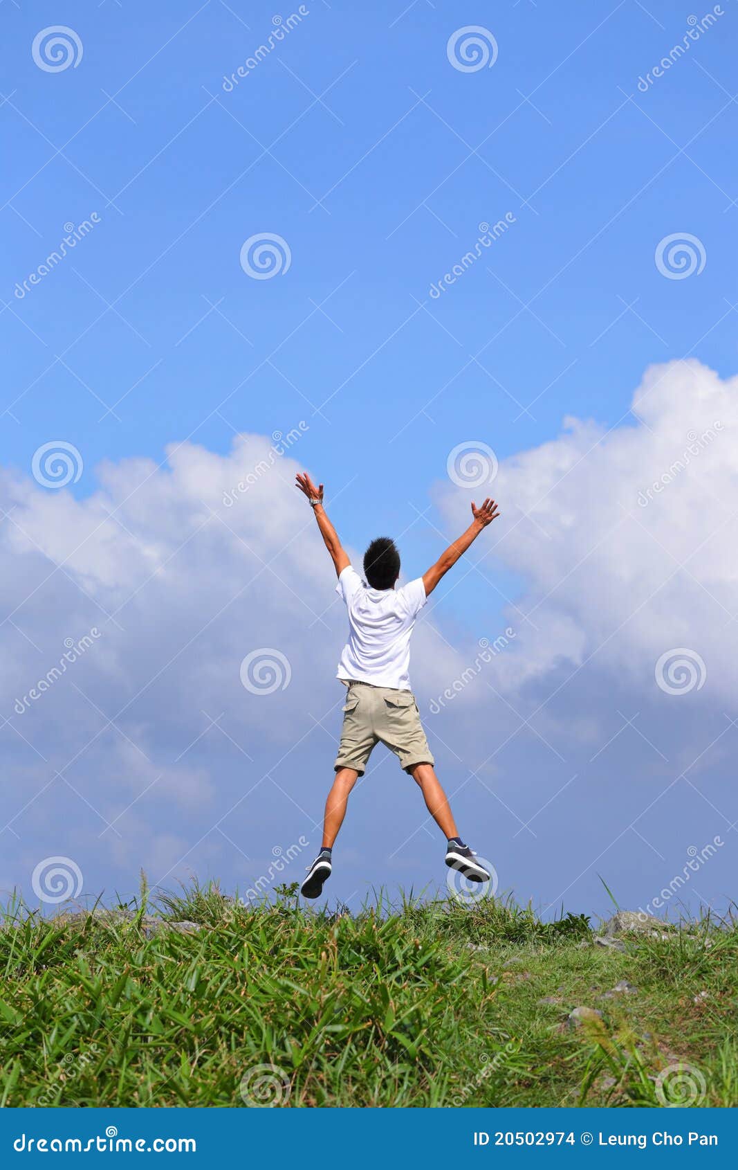 Happy man jump freely stock photo. Image of blue, excitement - 20502974