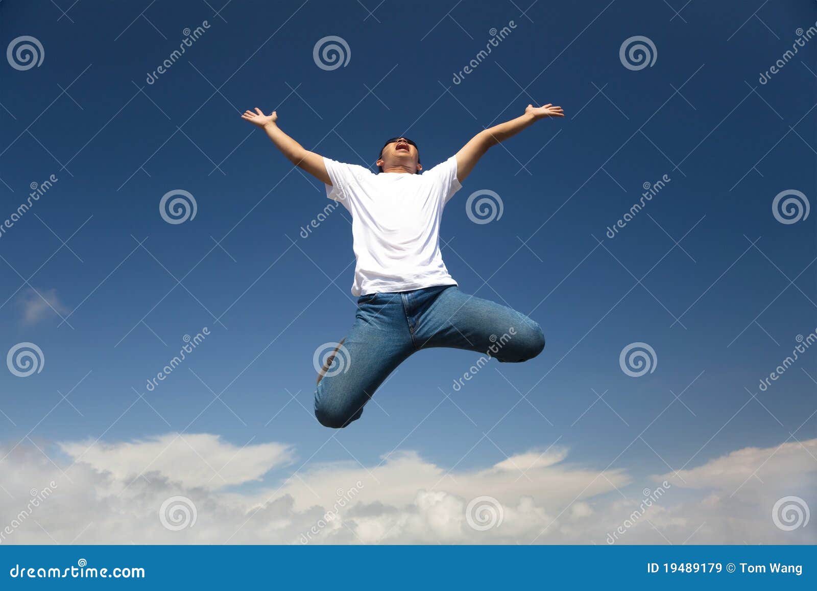 Happy man jumping stock image. Image of joyful, leisure - 19489179