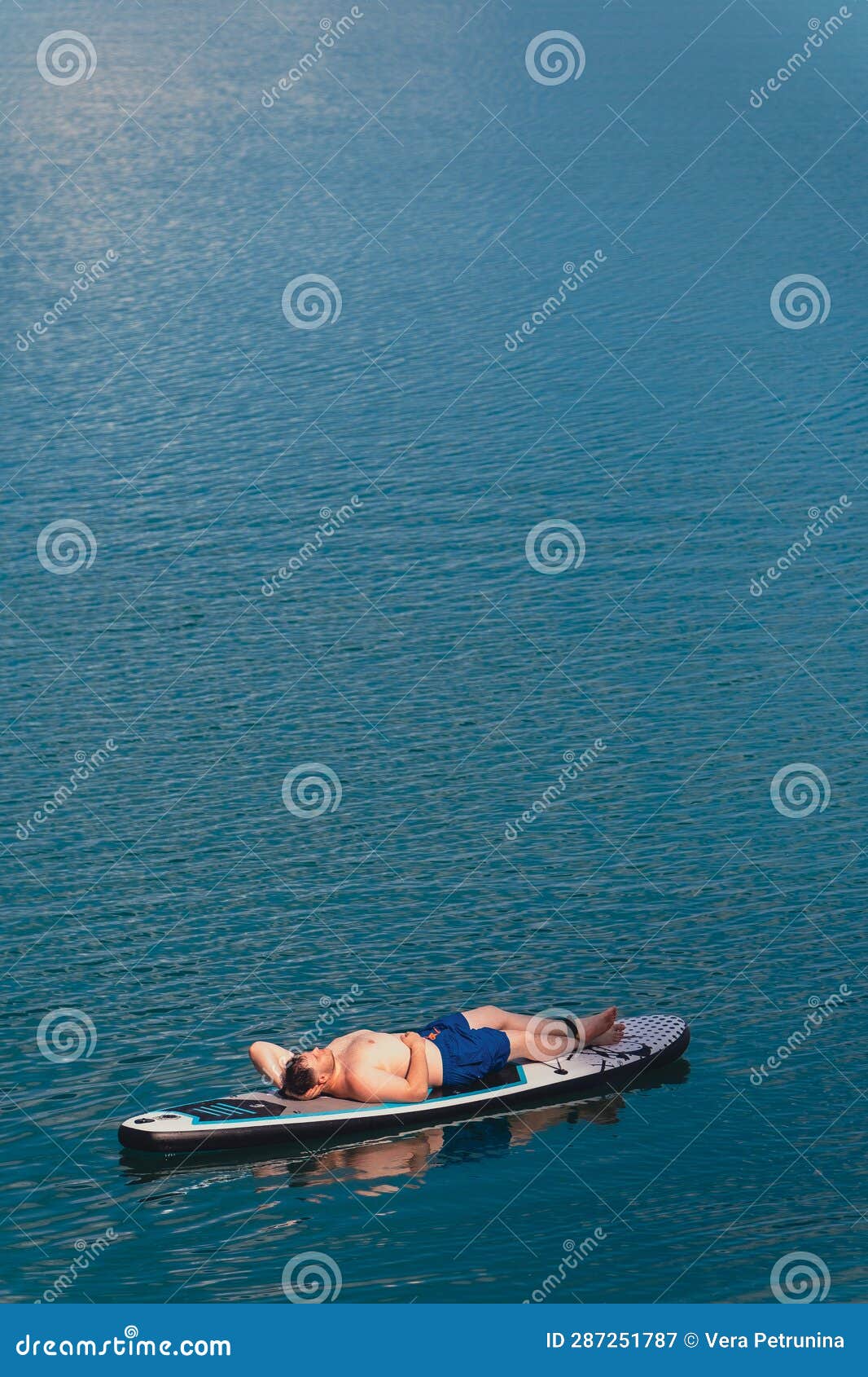 Happy Man Lays Down on Supboard Sunbathing Stock Image - Image of bank ...