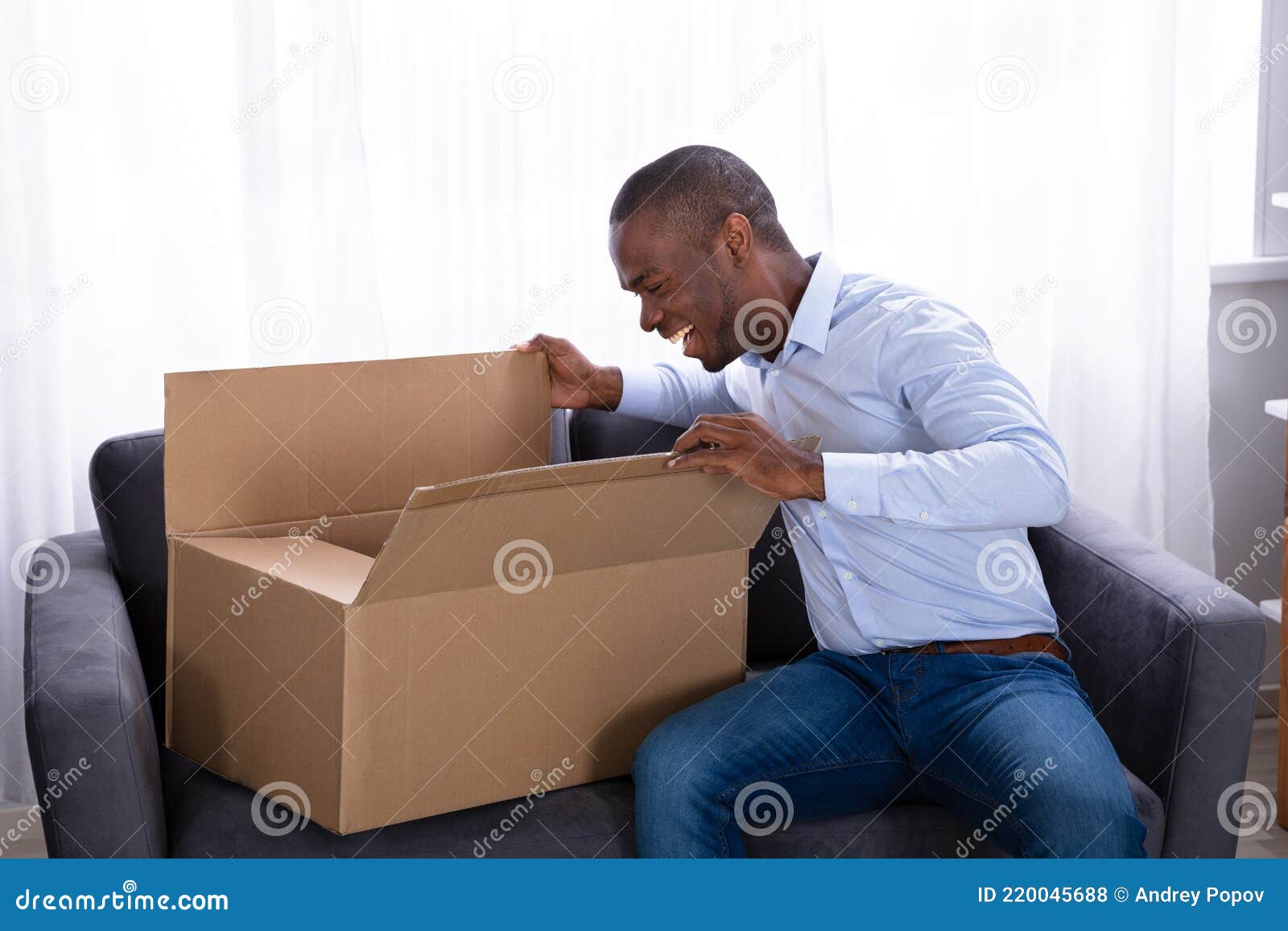 Happy Man Looking Inside Package Stock Photo - Image of pack, delivery ...