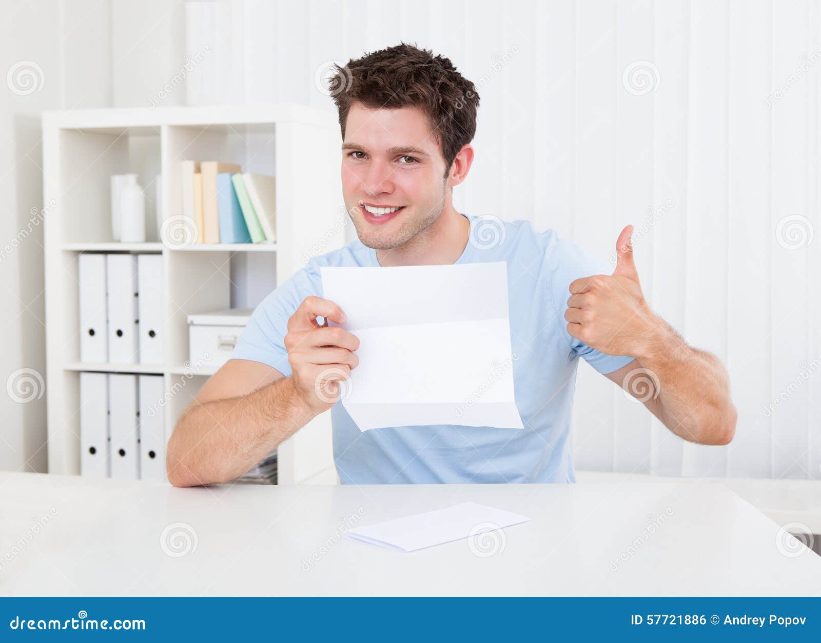 Happy Man Looking at Paper stock photo. Image of businessman - 57721886