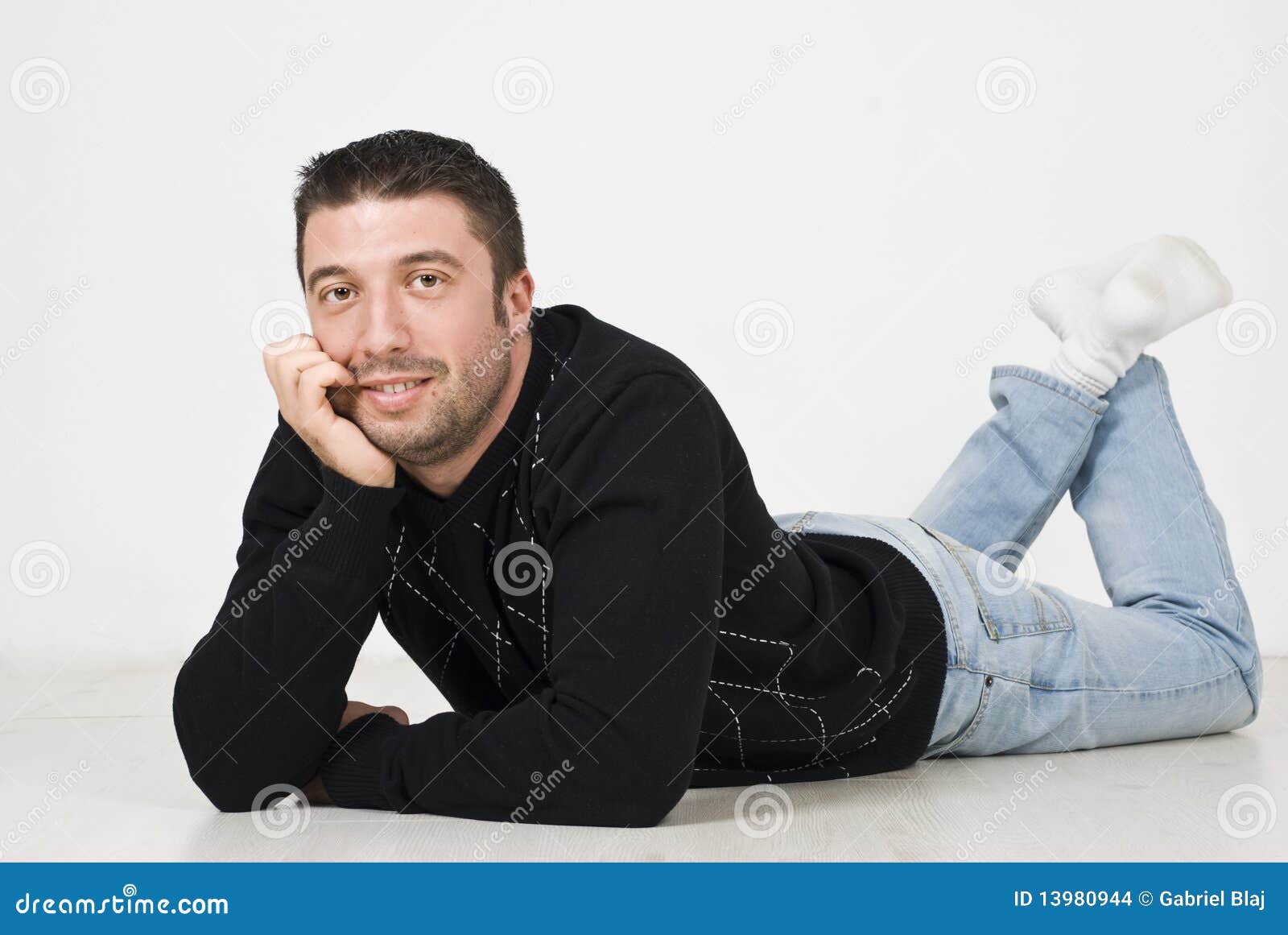 Happy Man Lying on Wooden Floor Stock Photo - Image of happiness ...