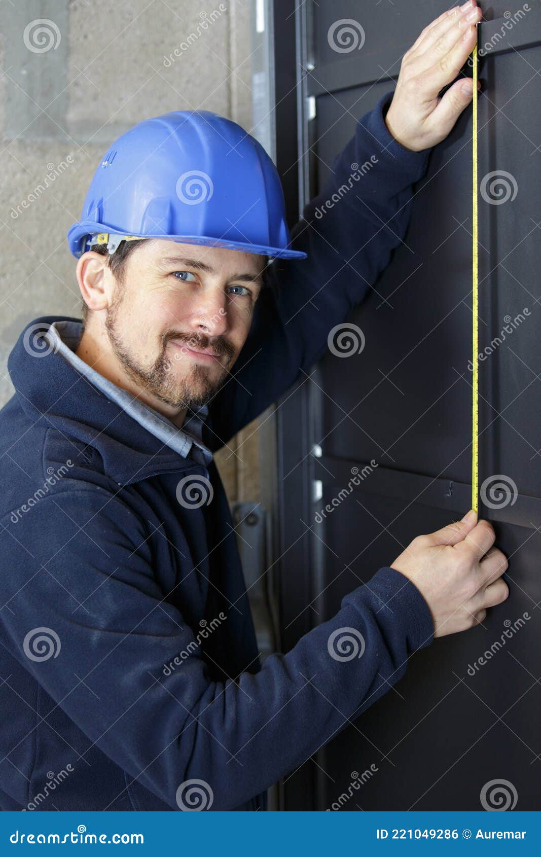 Happy Man Measuring Wall with Measuring Tape Stock Photo - Image of ...