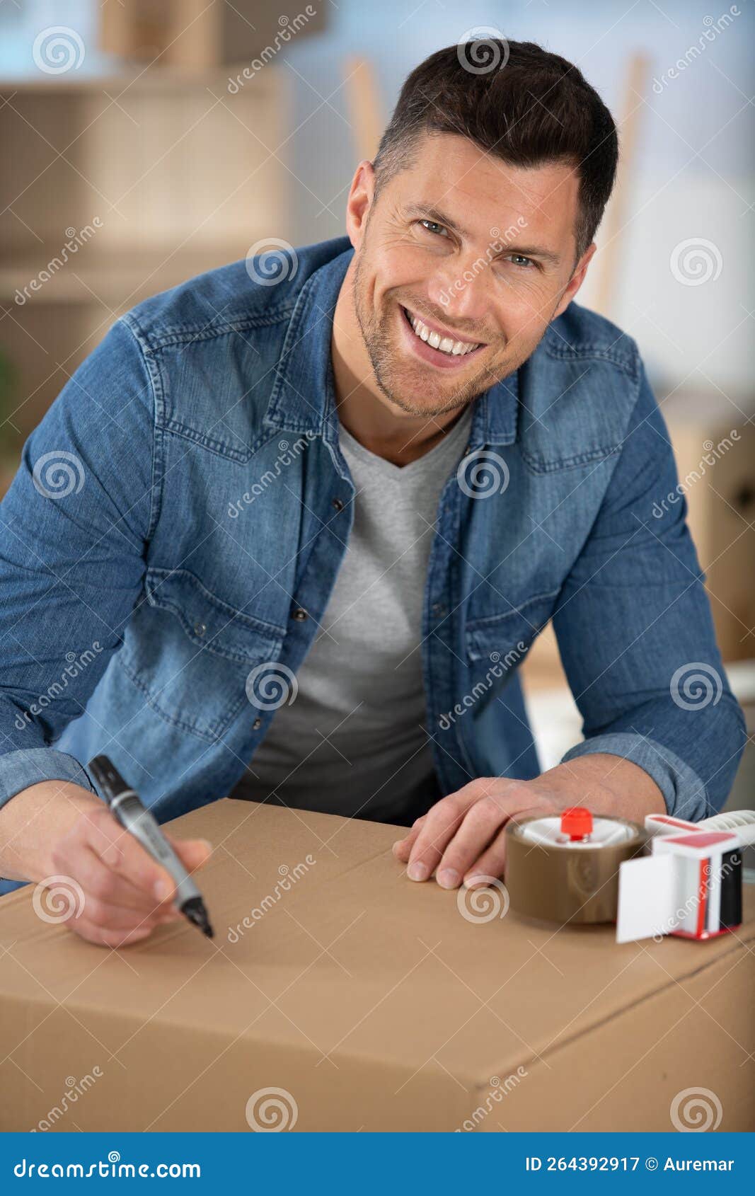 Happy Man Packs Gift Parcel on Table Stock Image - Image of delivery ...