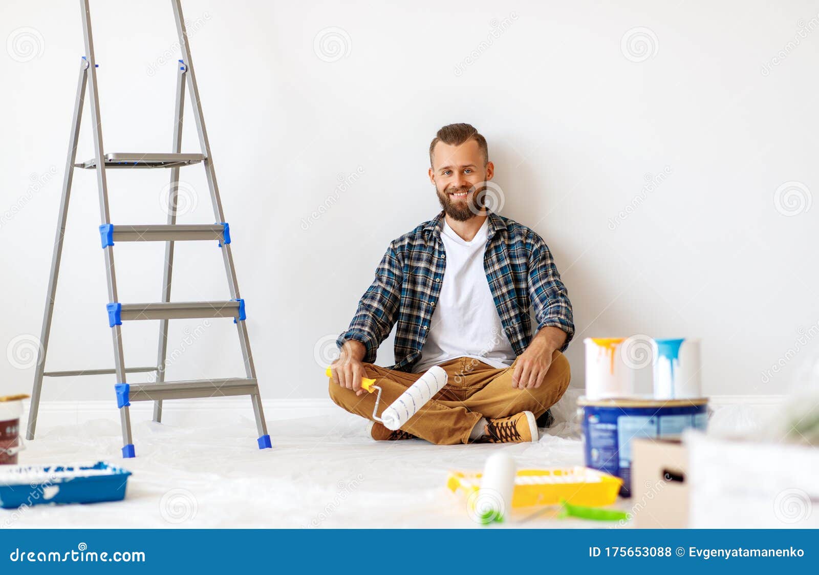 Happy Man Paints Wall in Apartment Stock Photo - Image of camera ...