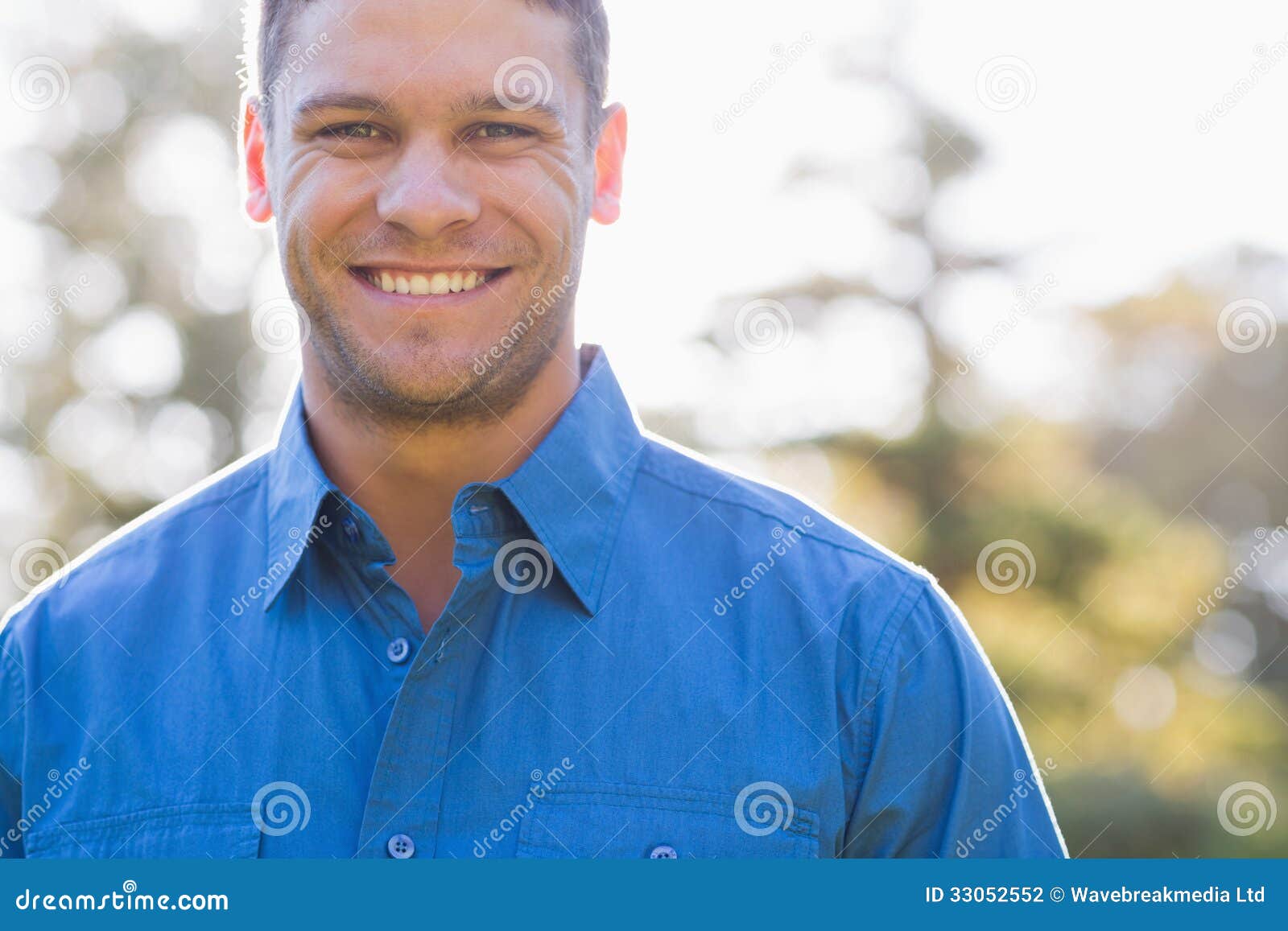 Happy man in the park stock photo. Image of looking, sunlight - 33052552
