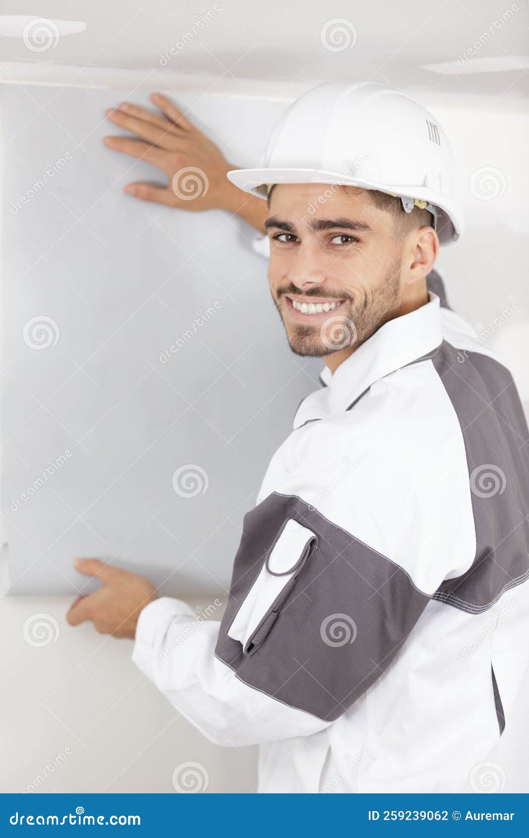 Happy man plastering stock photo. Image of ladder, concretewall - 259239062