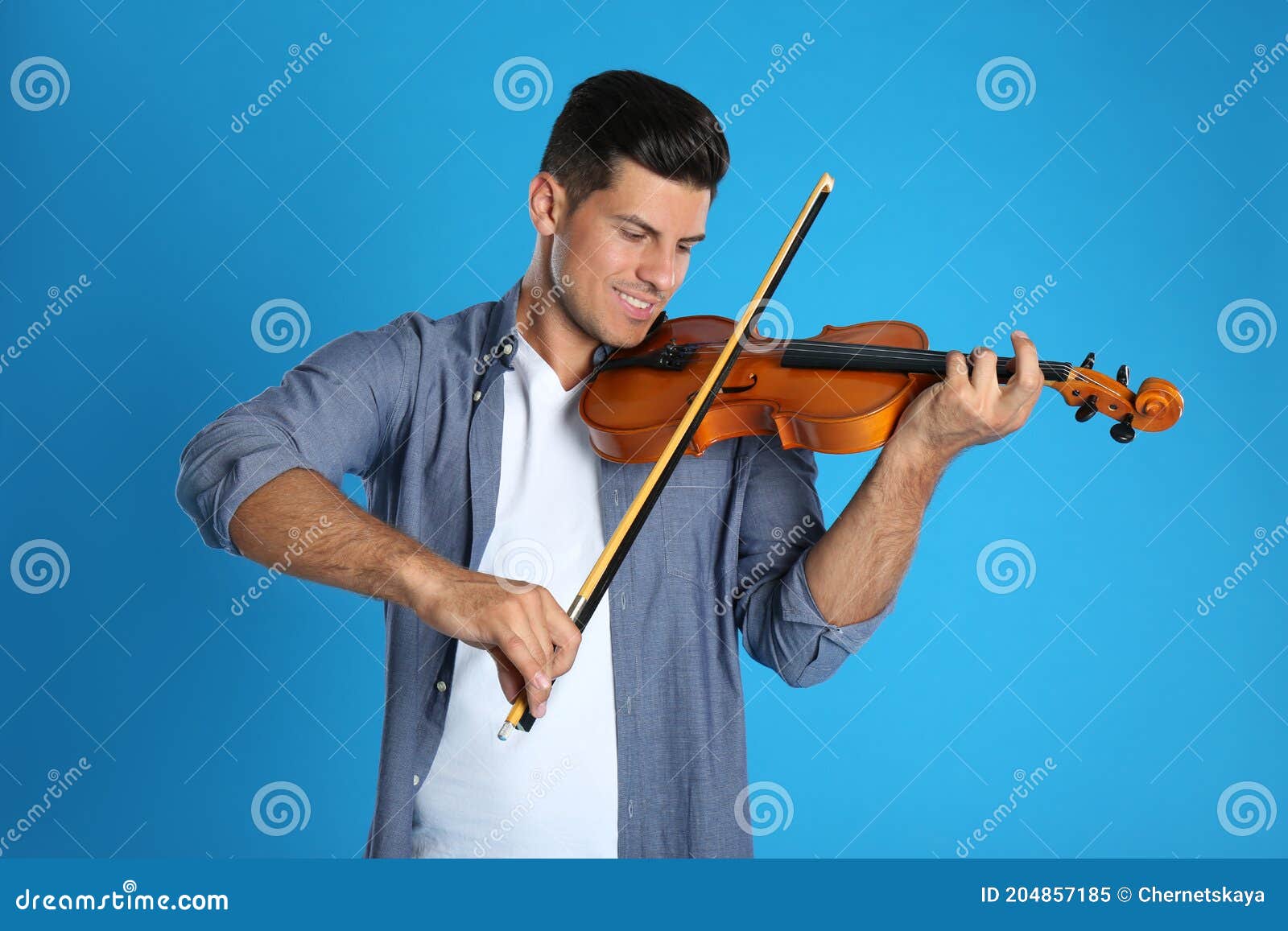 Happy Man Playing Violin on Light Blue Background Stock Image - Image ...