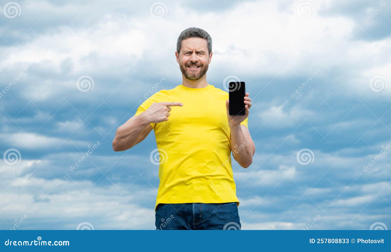 Happy Man Point Finger on Screen of Smartphone with Copy Space Stock ...