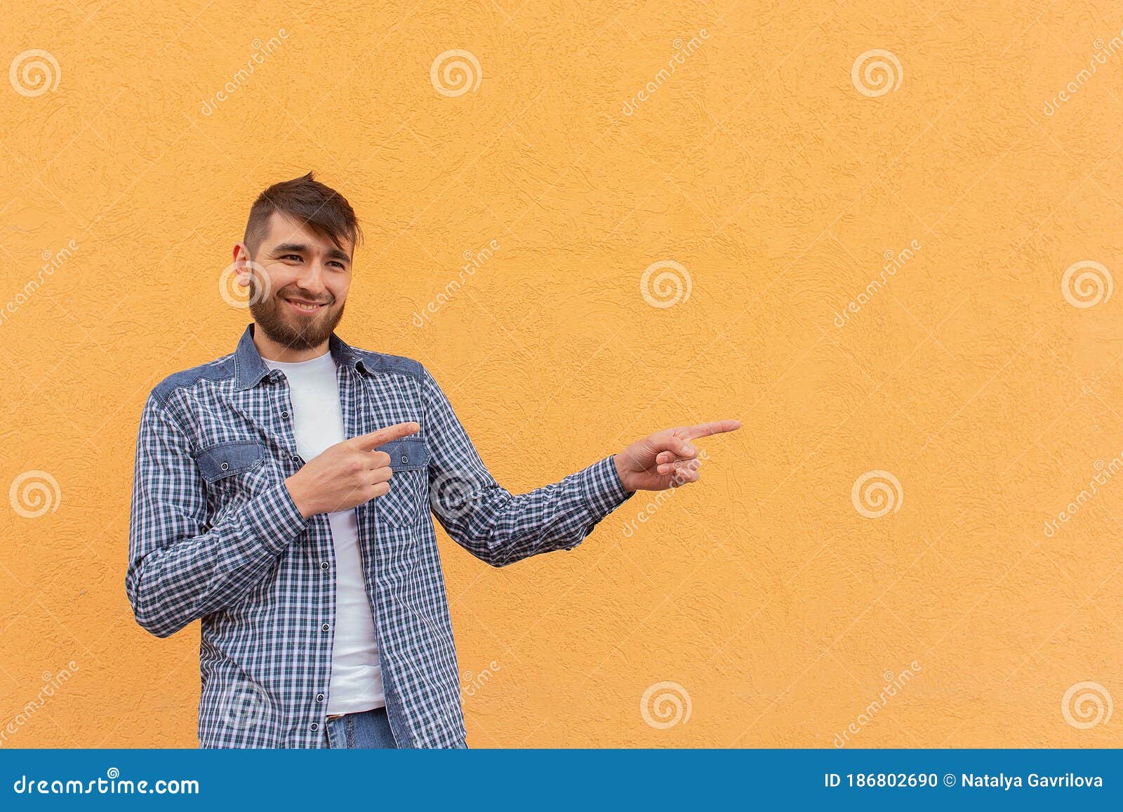 Happy Man Points His Hands To the Side Stock Photo - Image of gesturing ...