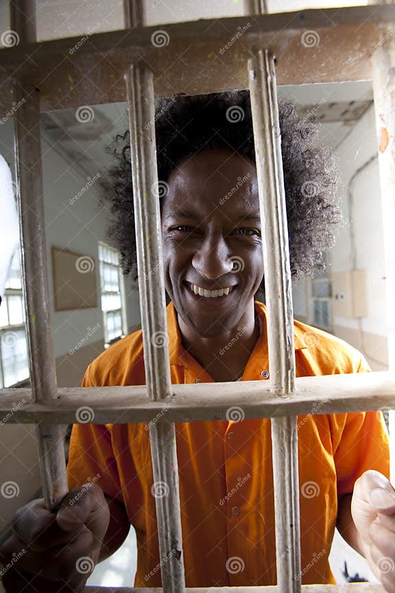 Happy Man in Prison Cell stock photo. Image of penitentiary - 13713904