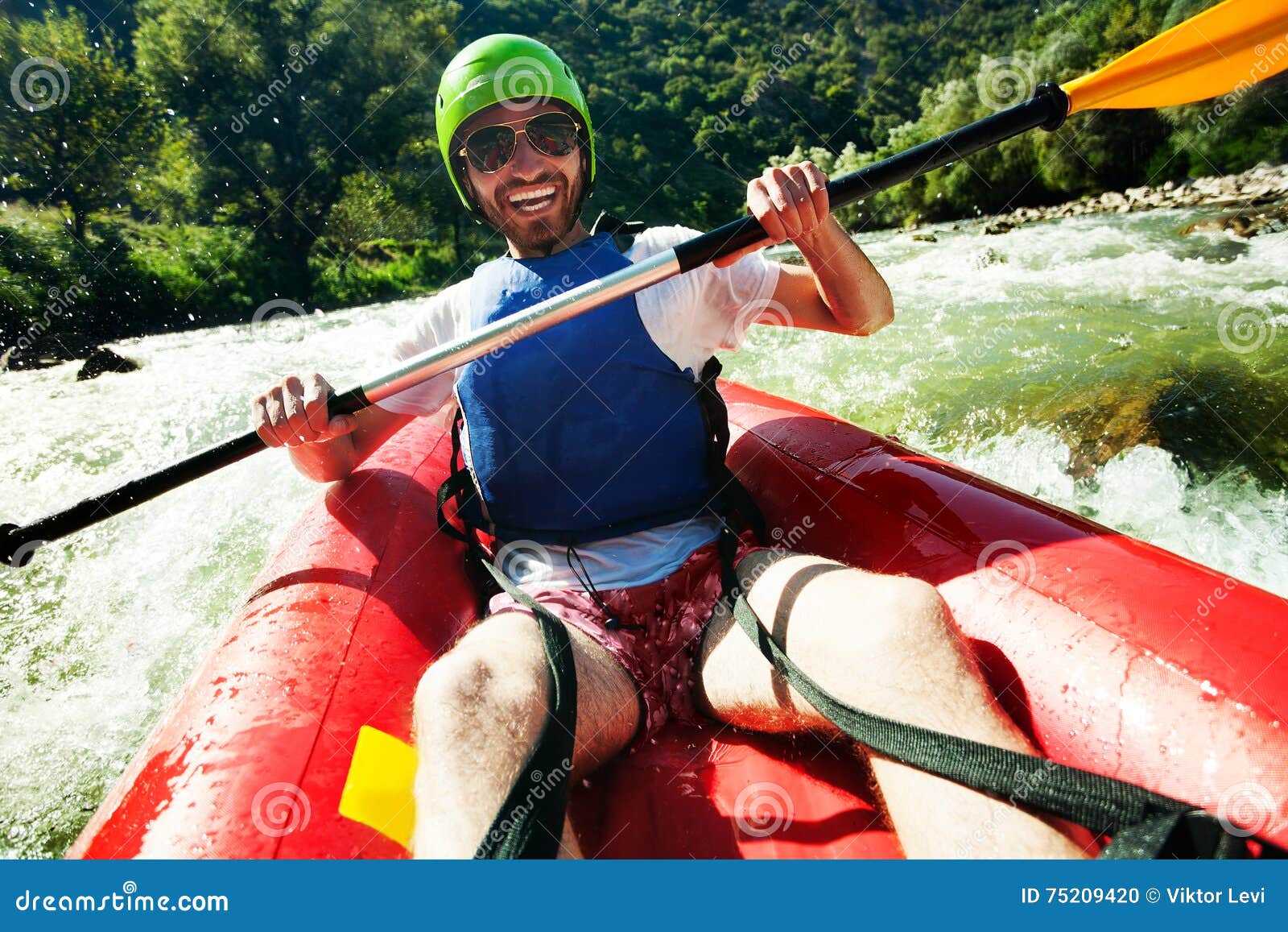 Happy man rafting stock photo. Image of vacation, male - 75209420