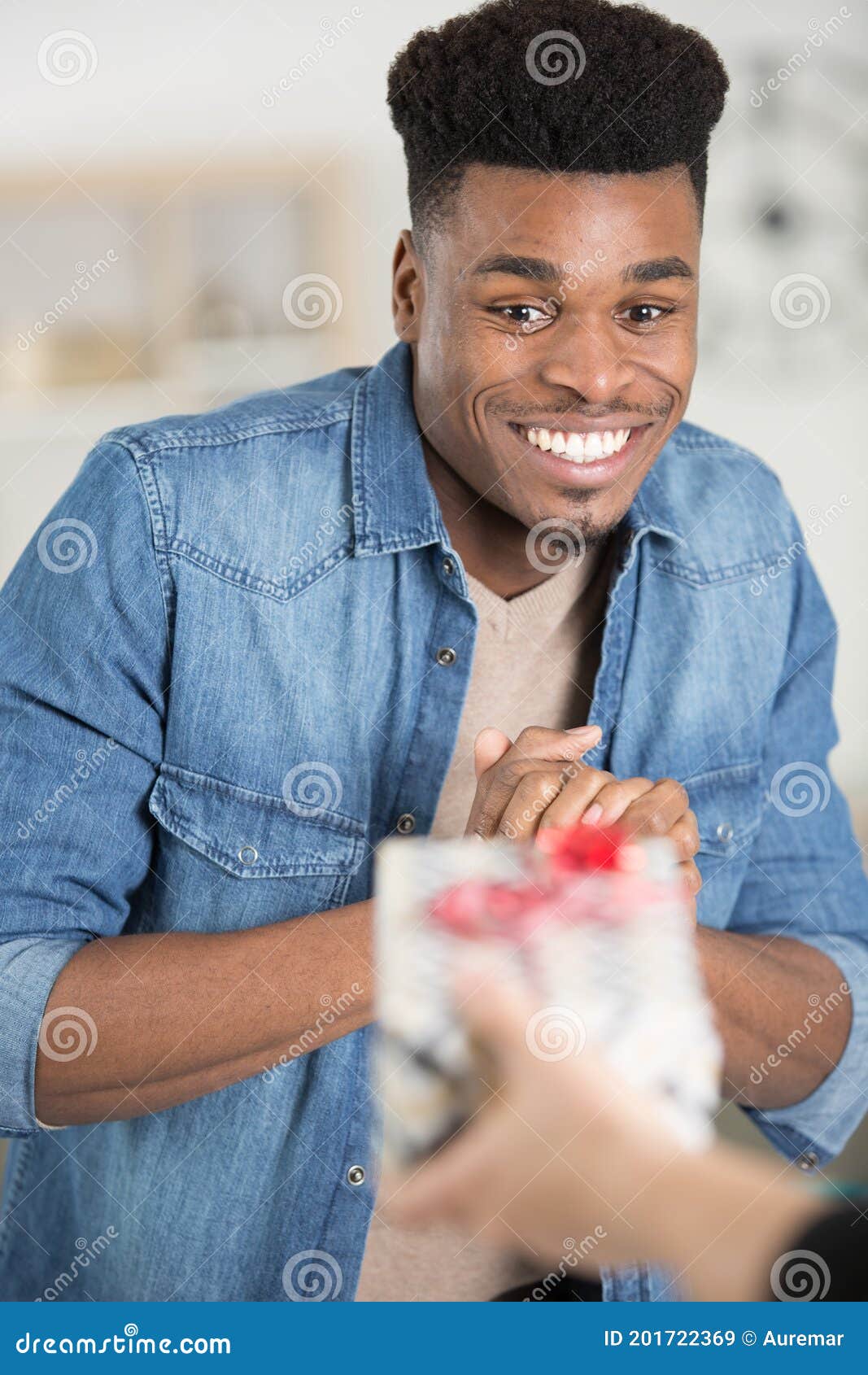 Happy Man Receiving Present Stock Image - Image of couch, beginning ...