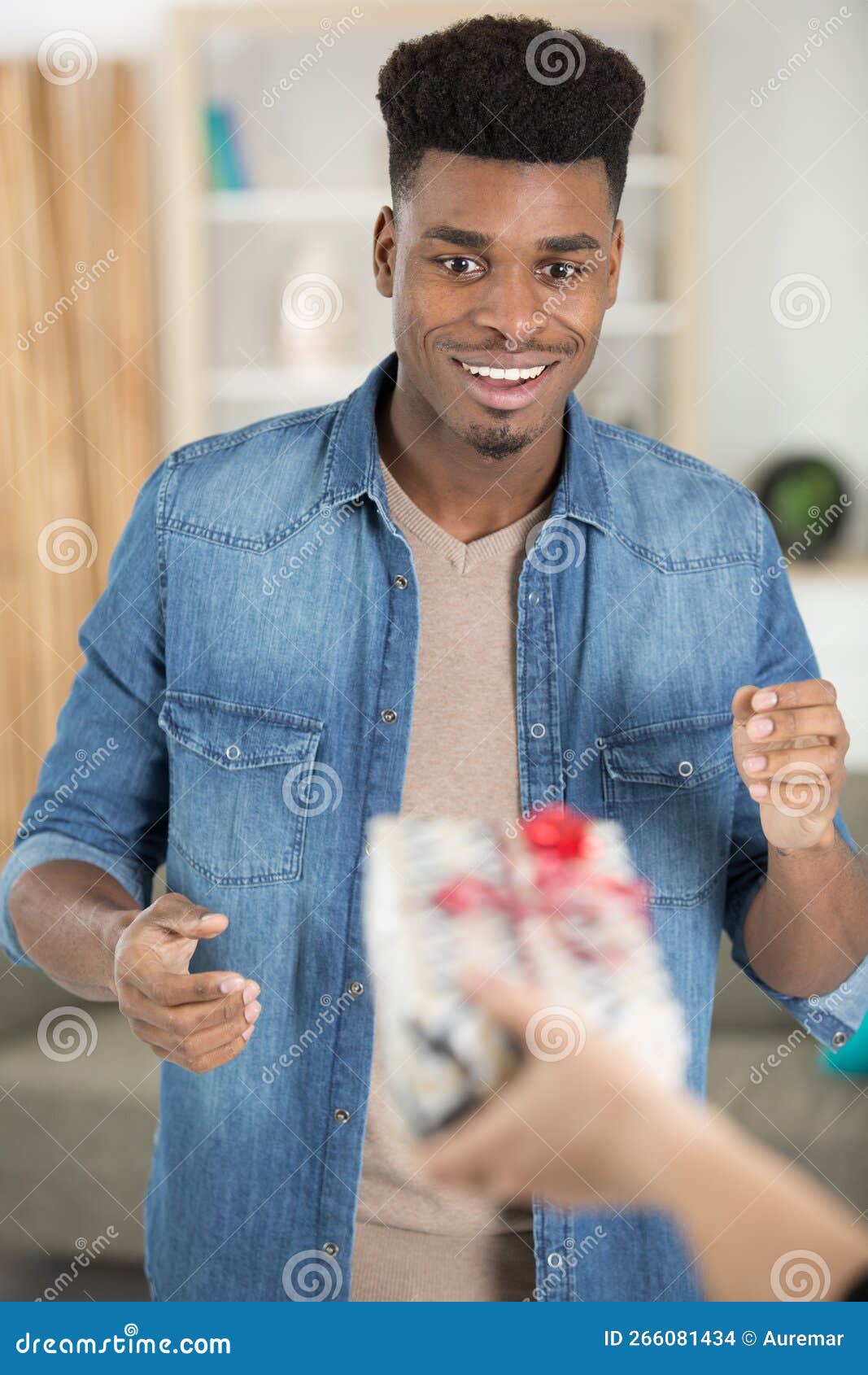 Happy man recieved present stock photo. Image of male - 266081434
