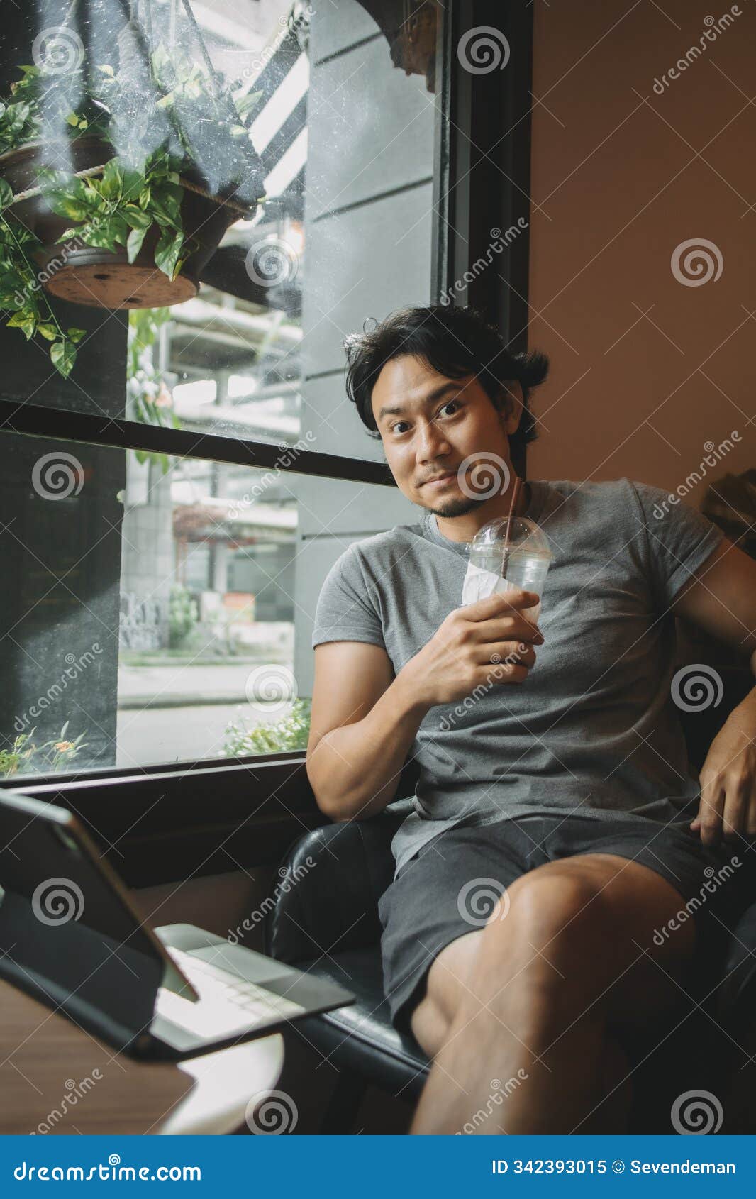 Happy Man Relaxed in the Cafe, Drinking Iced Coffee. Stock Image ...