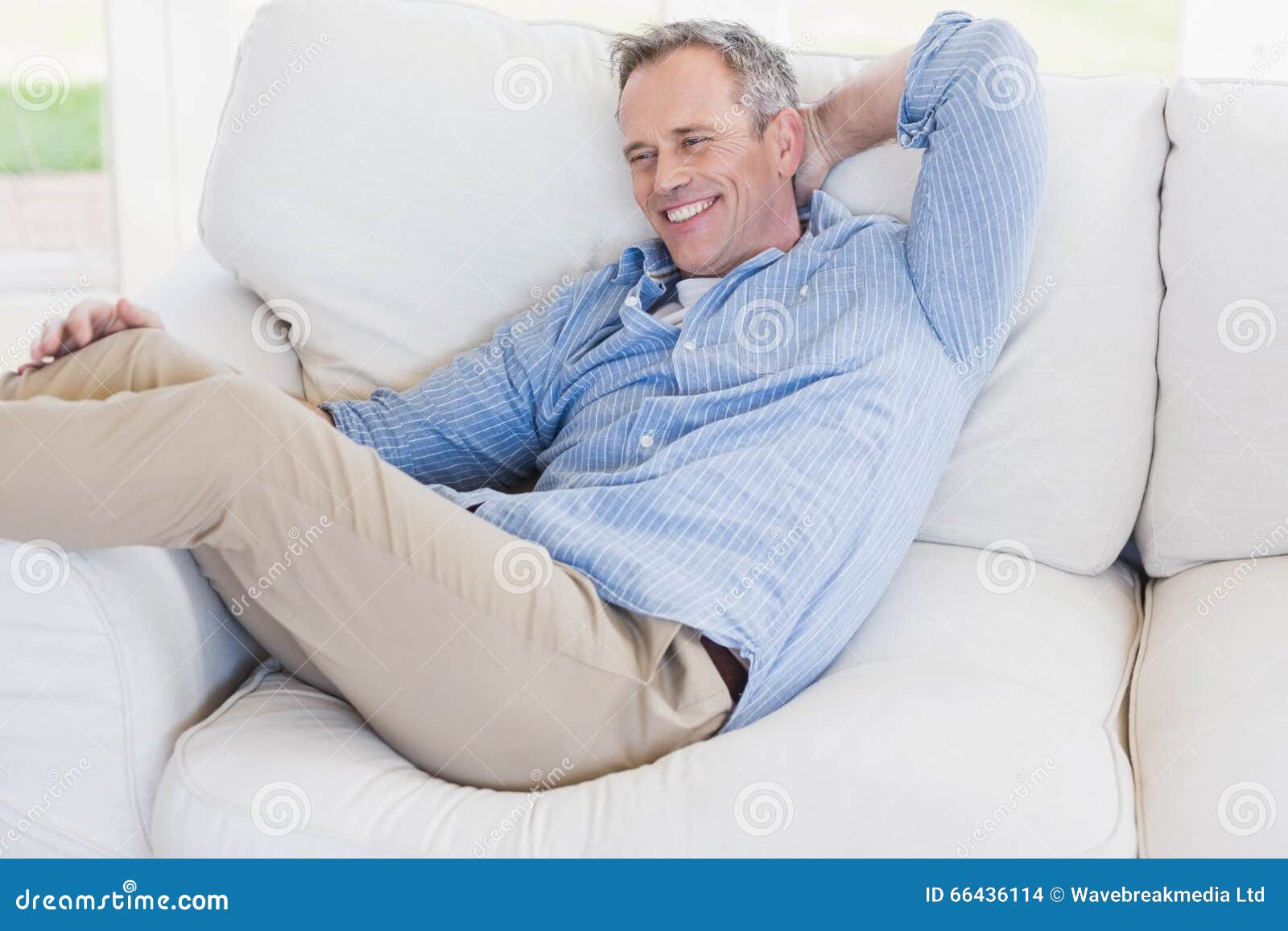 Happy Man Relaxing on the Couch Stock Photo - Image of caucasian, home ...