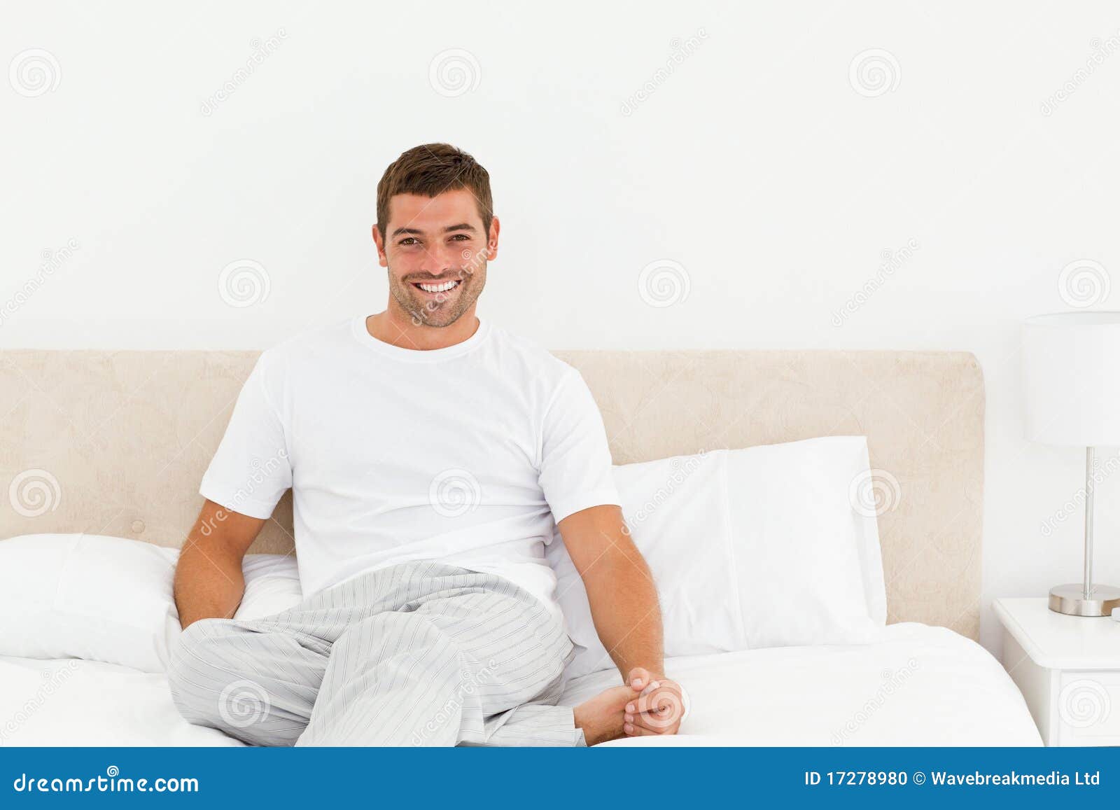 Happy Man Relaxing on His Bed at Home Stock Photo - Image of glad ...