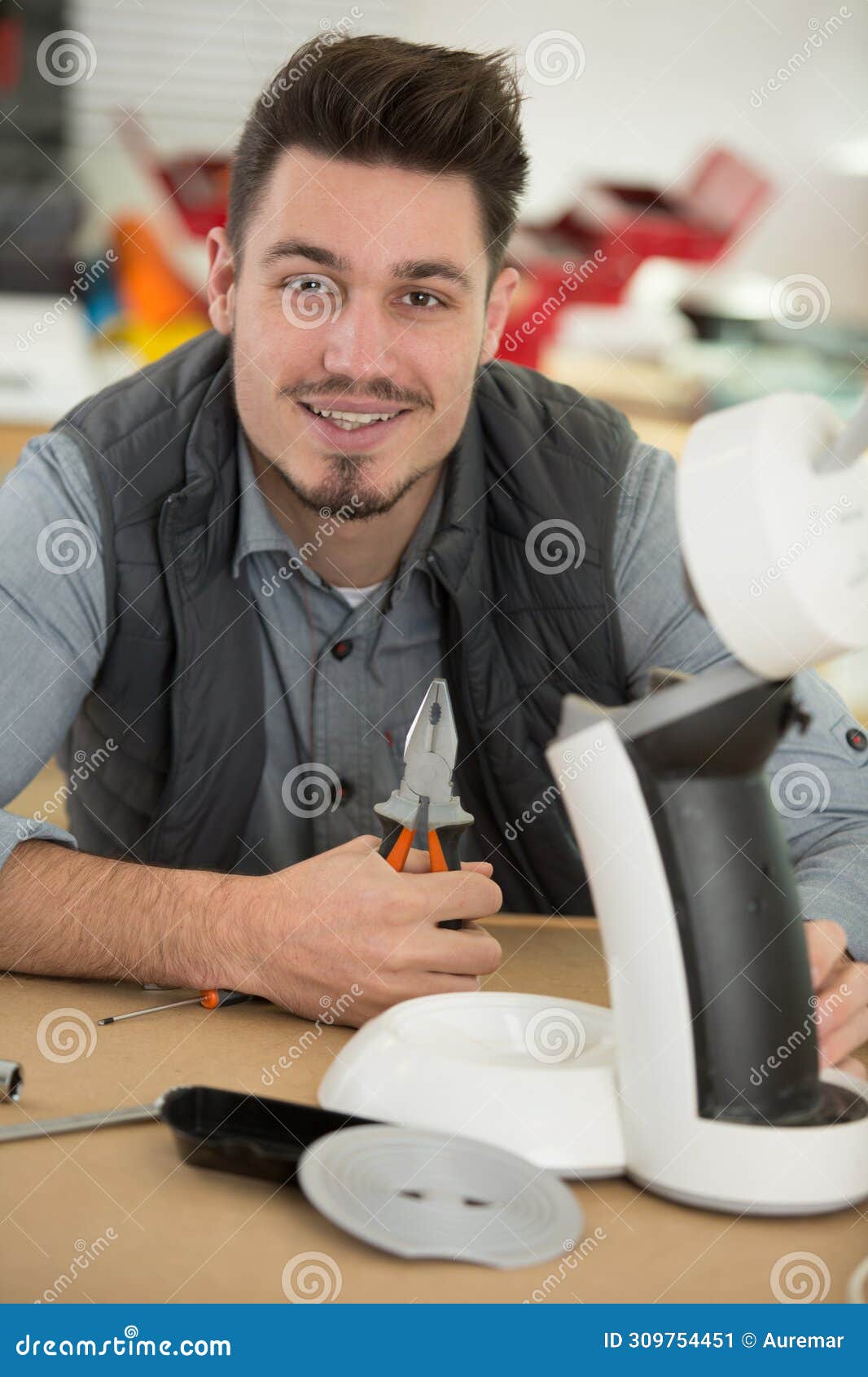 Happy Man Repairing Coffee Machine in Kitchen Stock Image - Image of ...