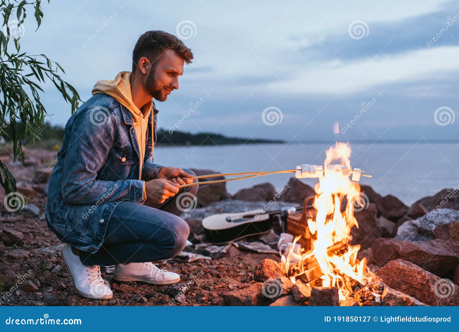 Happy Man Roasting Marshmallows on Sticks Stock Image - Image of ...