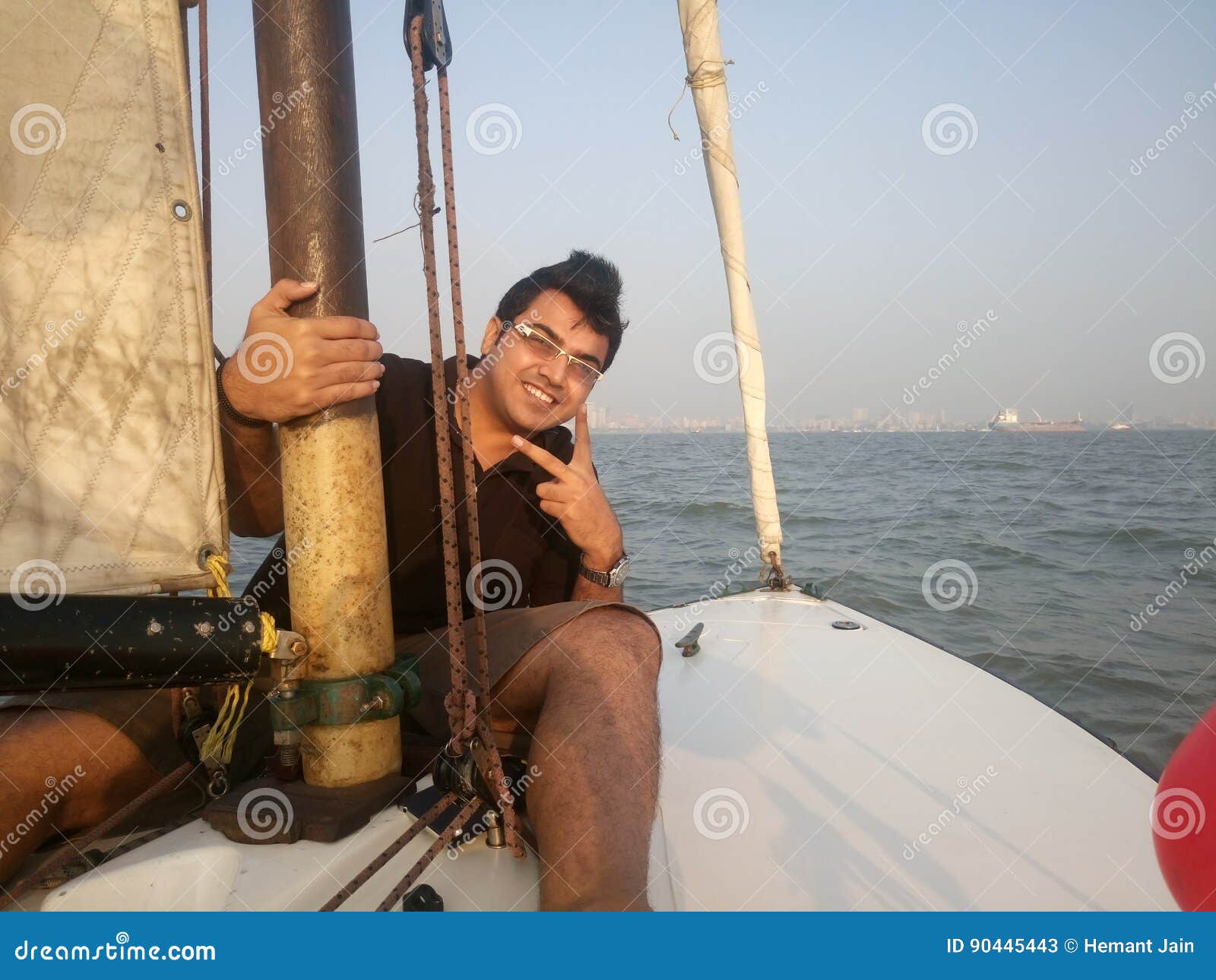 Happy man sailing in boat stock image. Image of gesture - 90445443