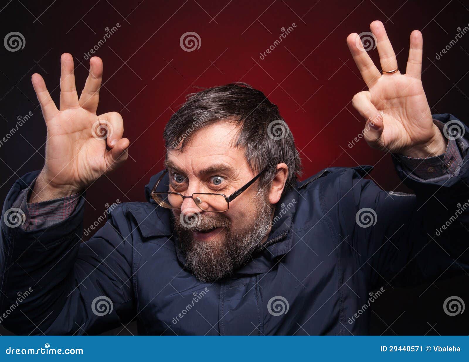 Happy Man Shows Ok Sigh on a Red Stock Image - Image of casual, haired ...