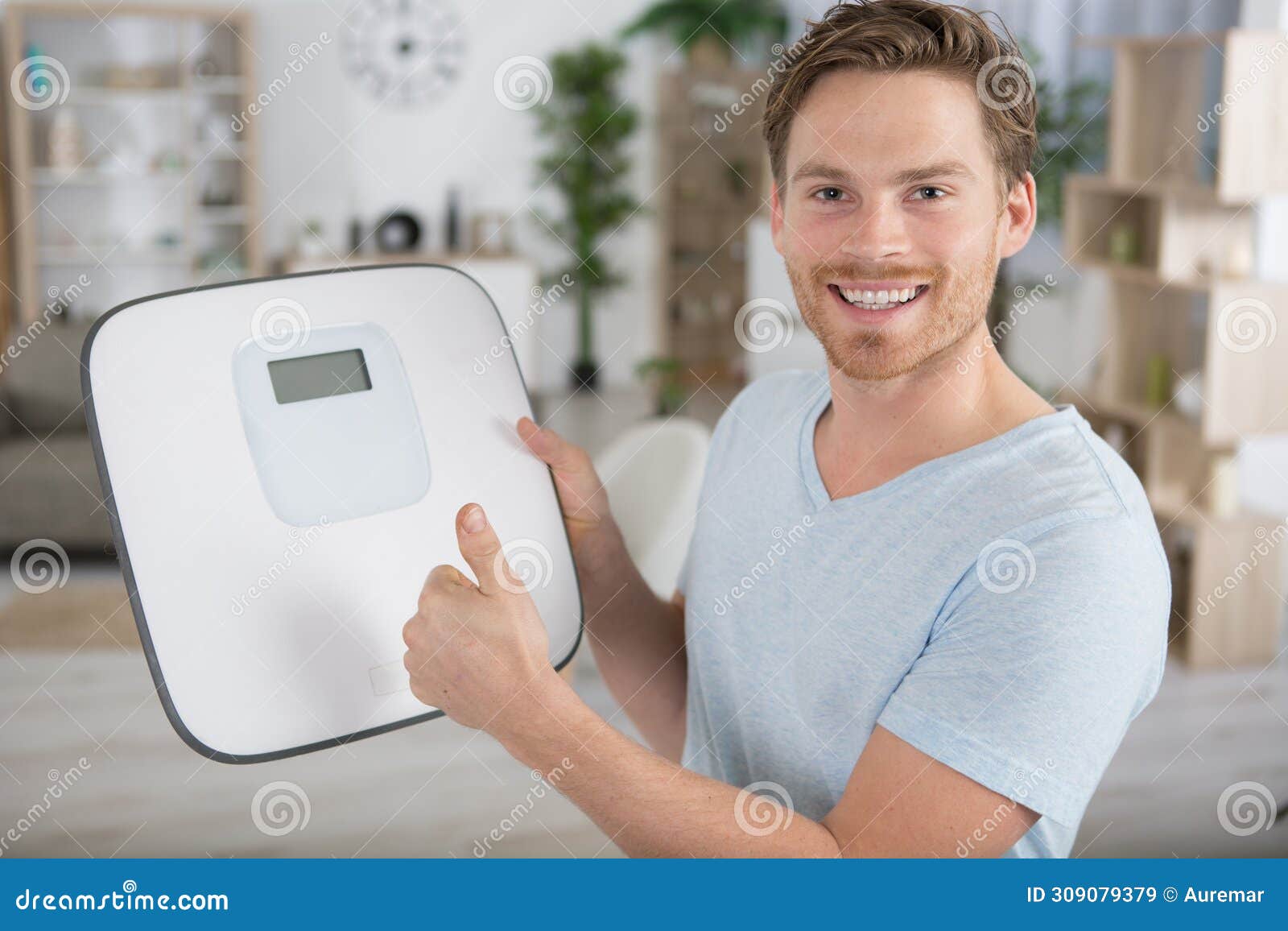 Happy Man Shows Thumb Up and Scale at Camera Stock Image - Image of ...